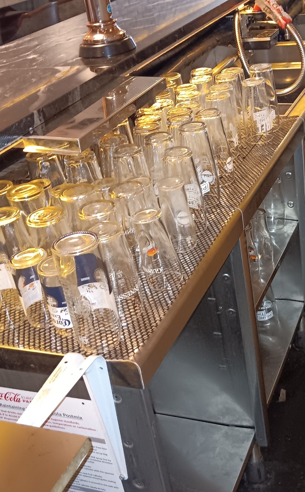 Quantity of assorted glassware to bar area, branded and unbranded ...