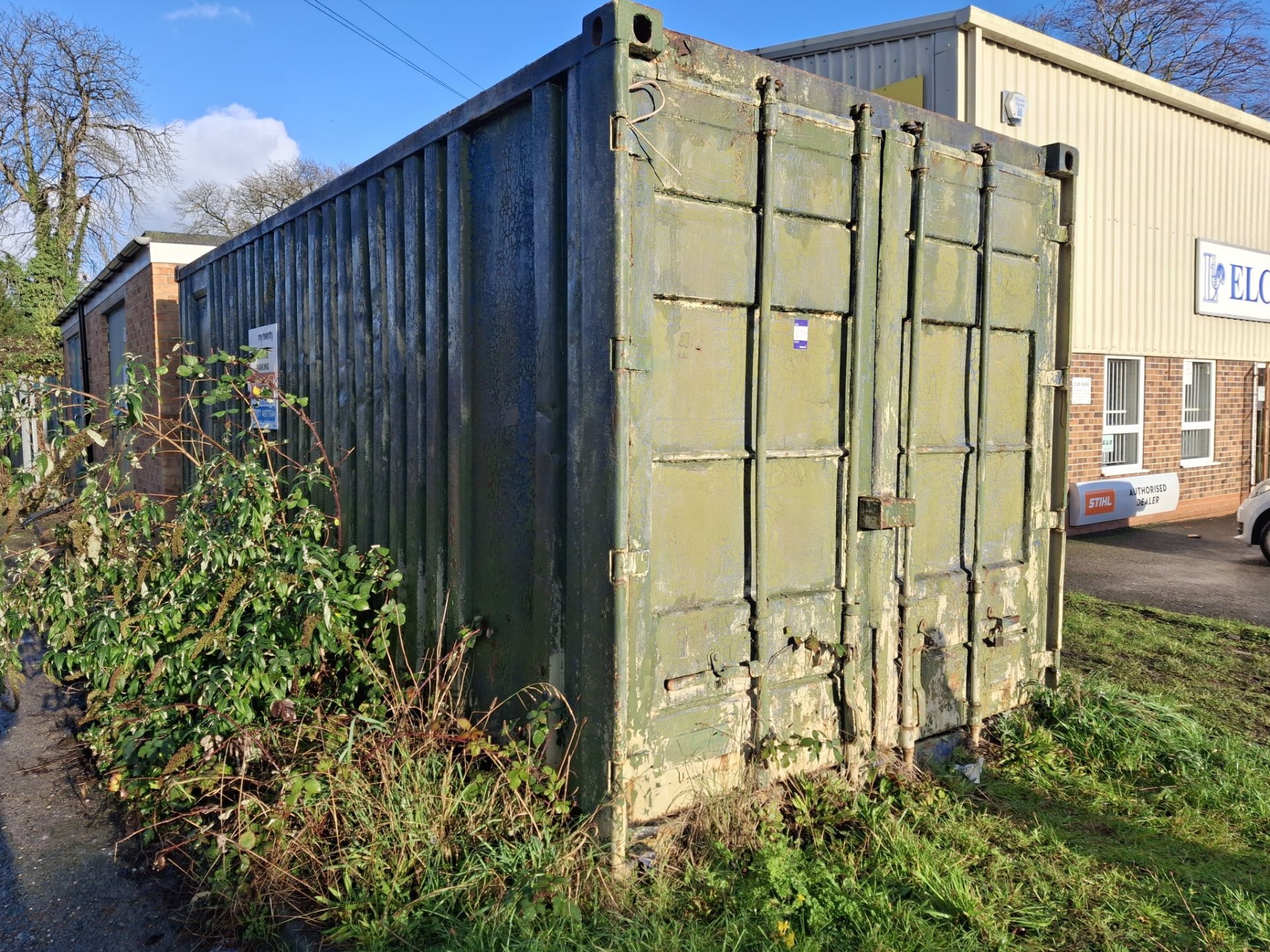 20' shipping container and remaining contents (delayed collection until ...
