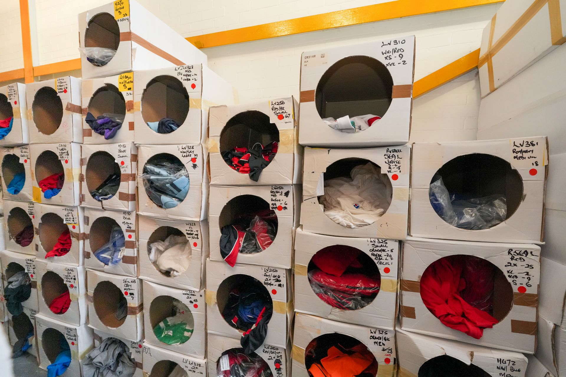 Very large quantity of assorted clothing to aisle 1. This lot also ...