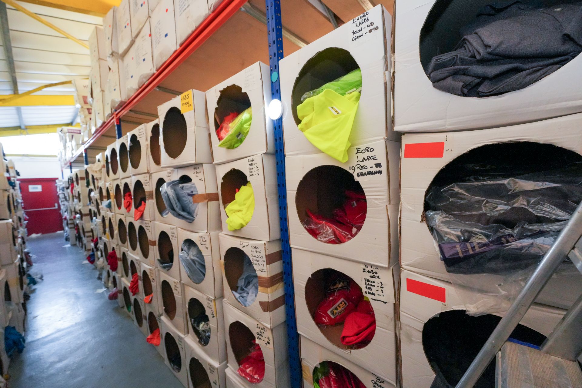 Very large quantity of assorted clothing to aisle 1. This lot also ...