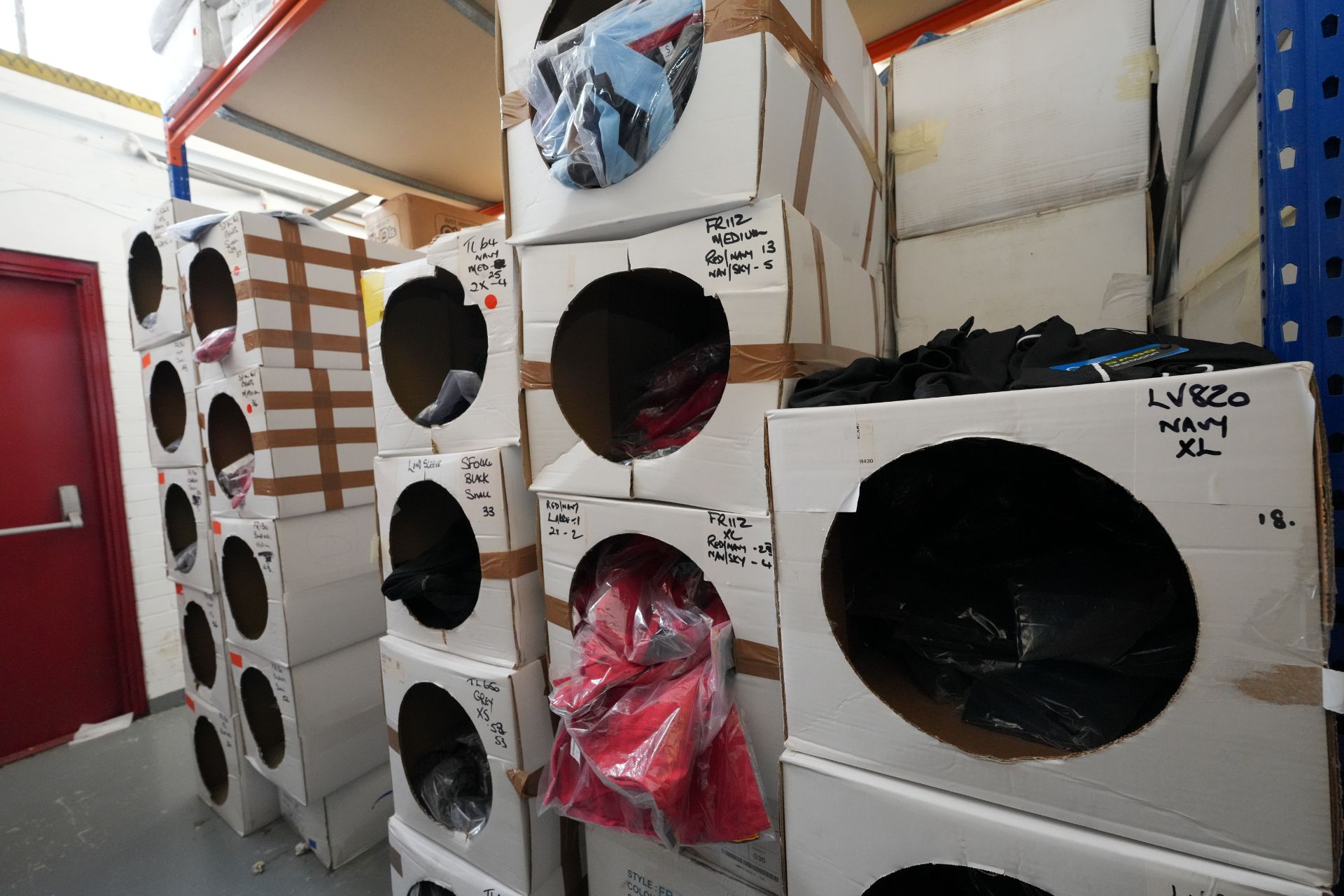 Very large quantity of assorted clothing to aisle 1