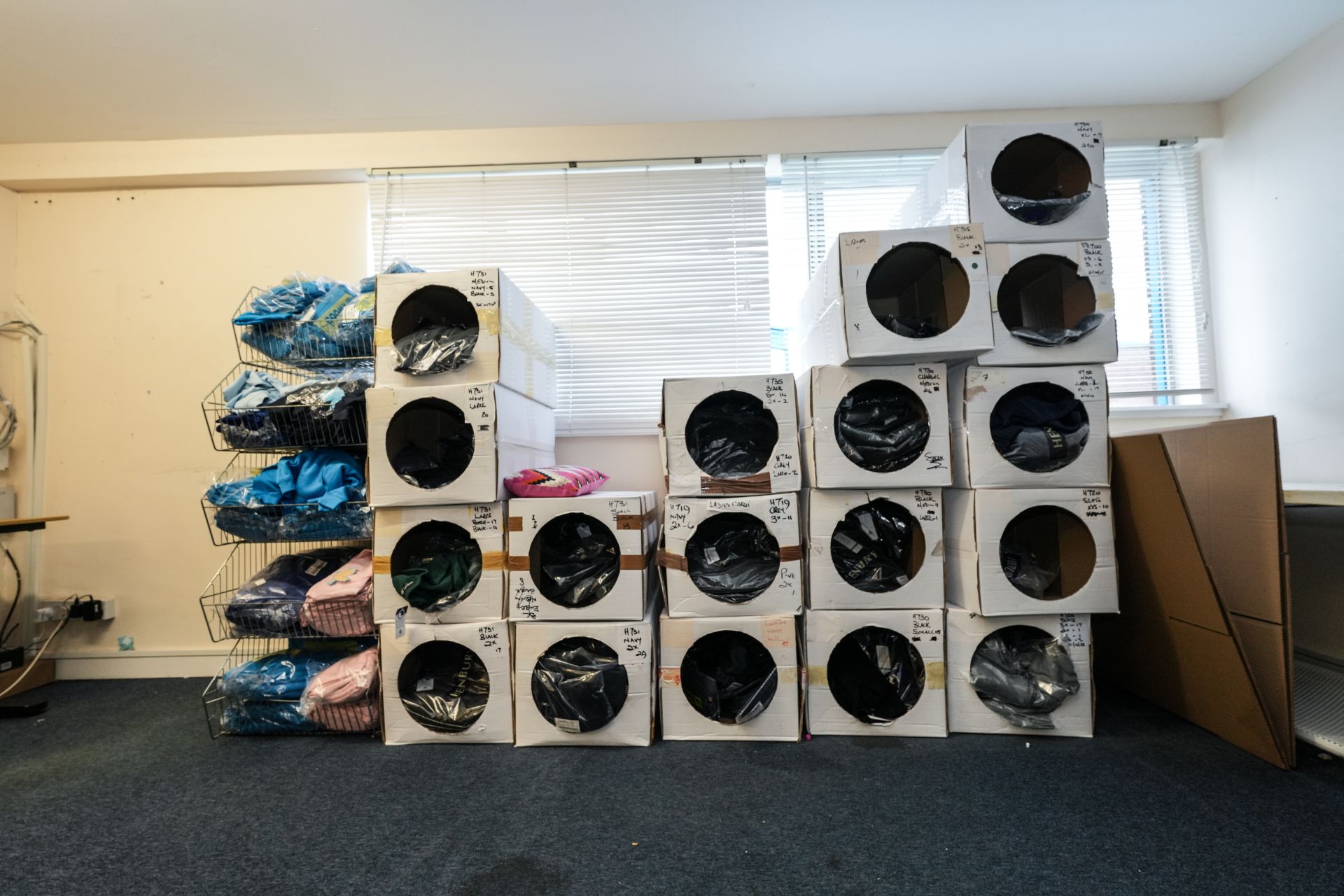 Large quantity of assorted clothing to offices. This lot also forms ...