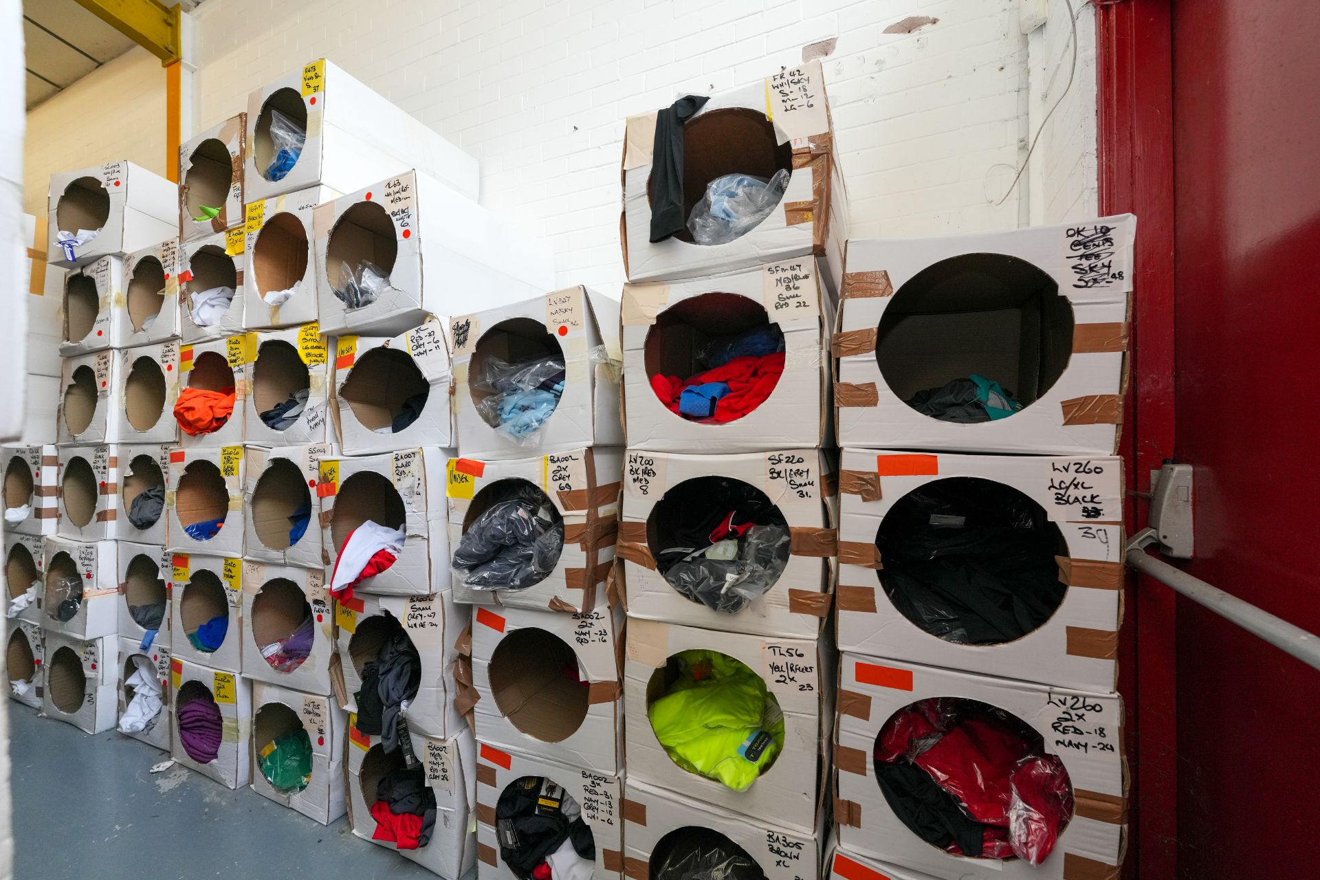 Very large quantity of assorted clothing to aisle 1. This lot also ...