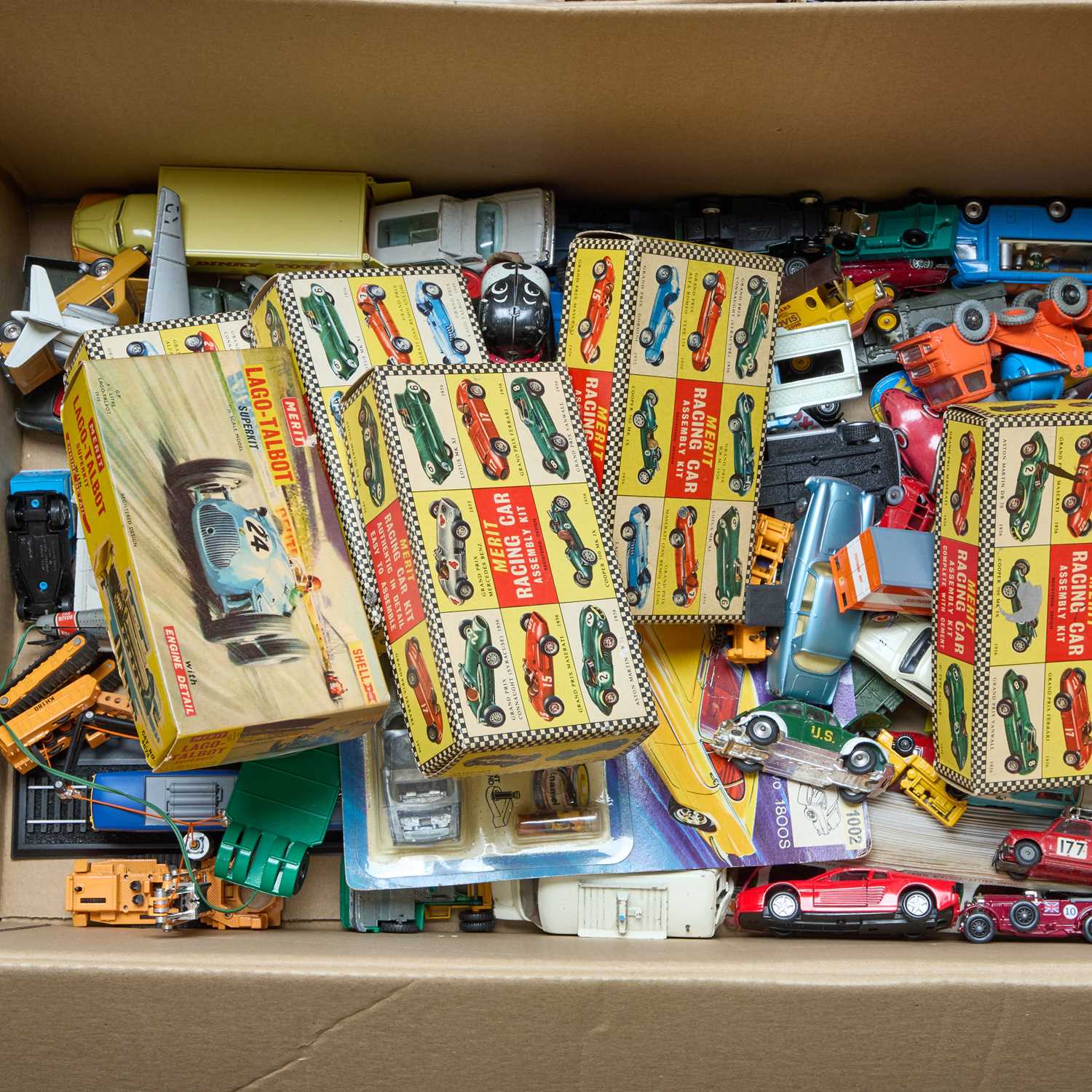 A BOX OF MODEL CARS, ETC. including Merit Racing Car Assembly Kits. (1 box)
