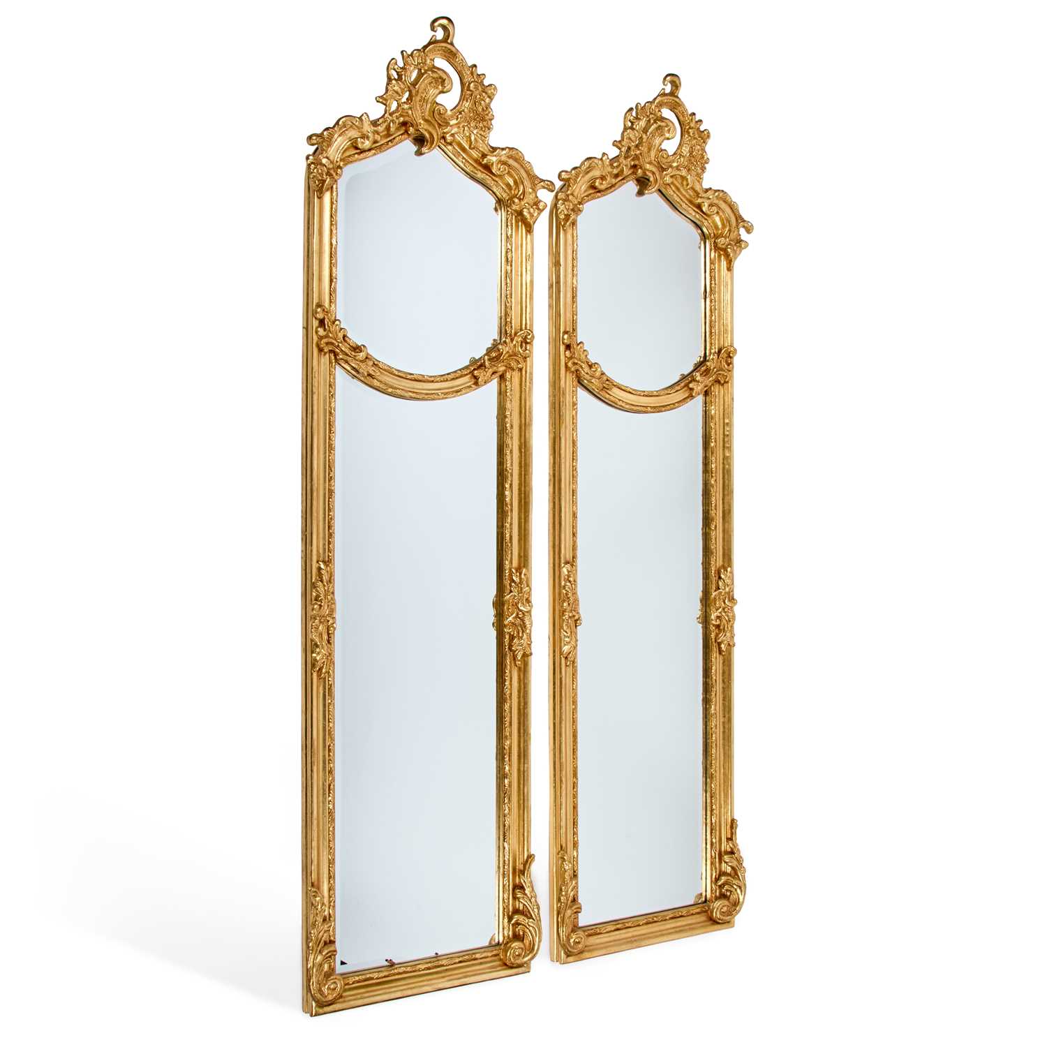 A PAIR OF PERIOD STYLE GILT FRAMED MIRRORS each with a scroll moulded ...