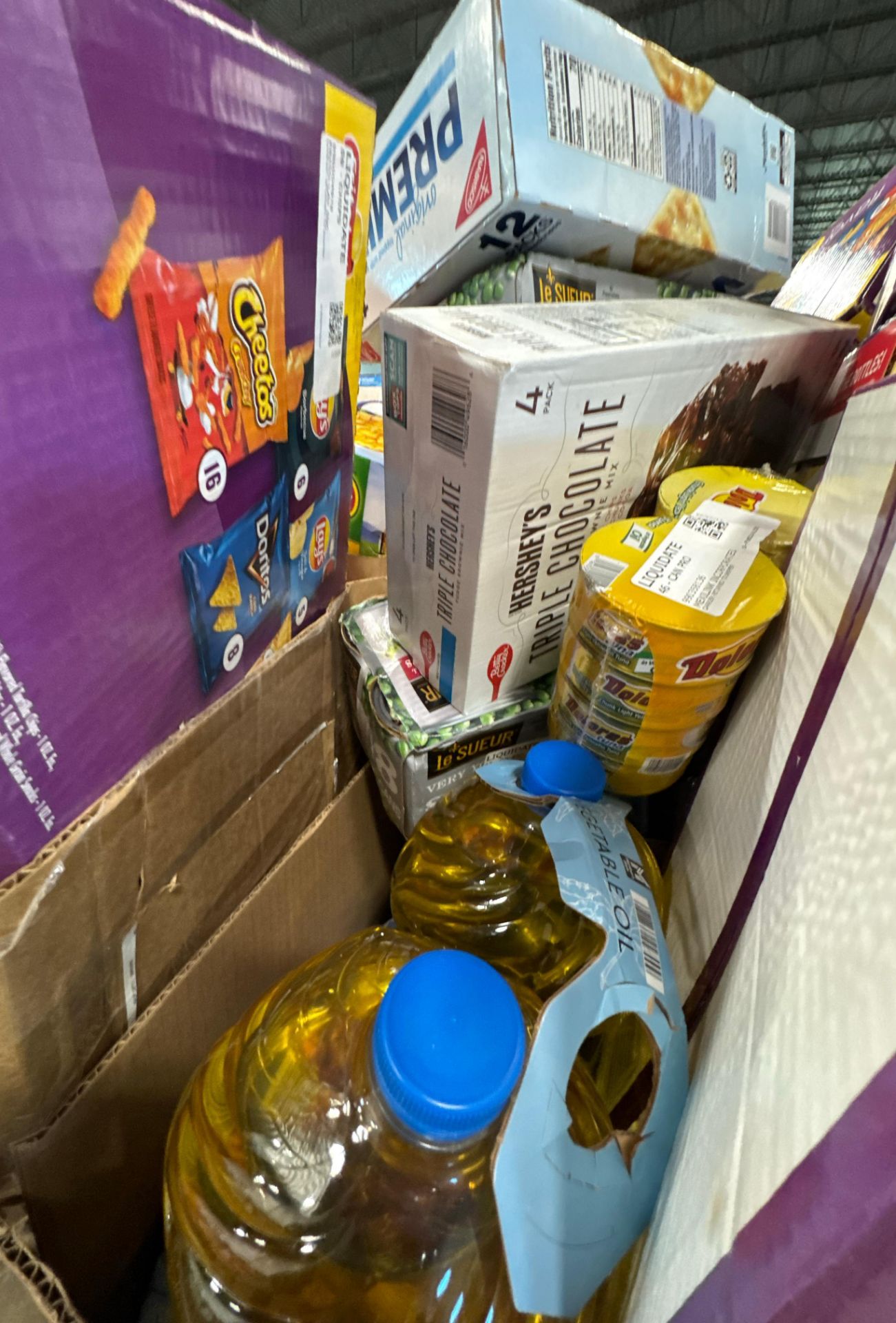 Big box store in a box: chips, corn, brownies, tuna, vegetable oil ...