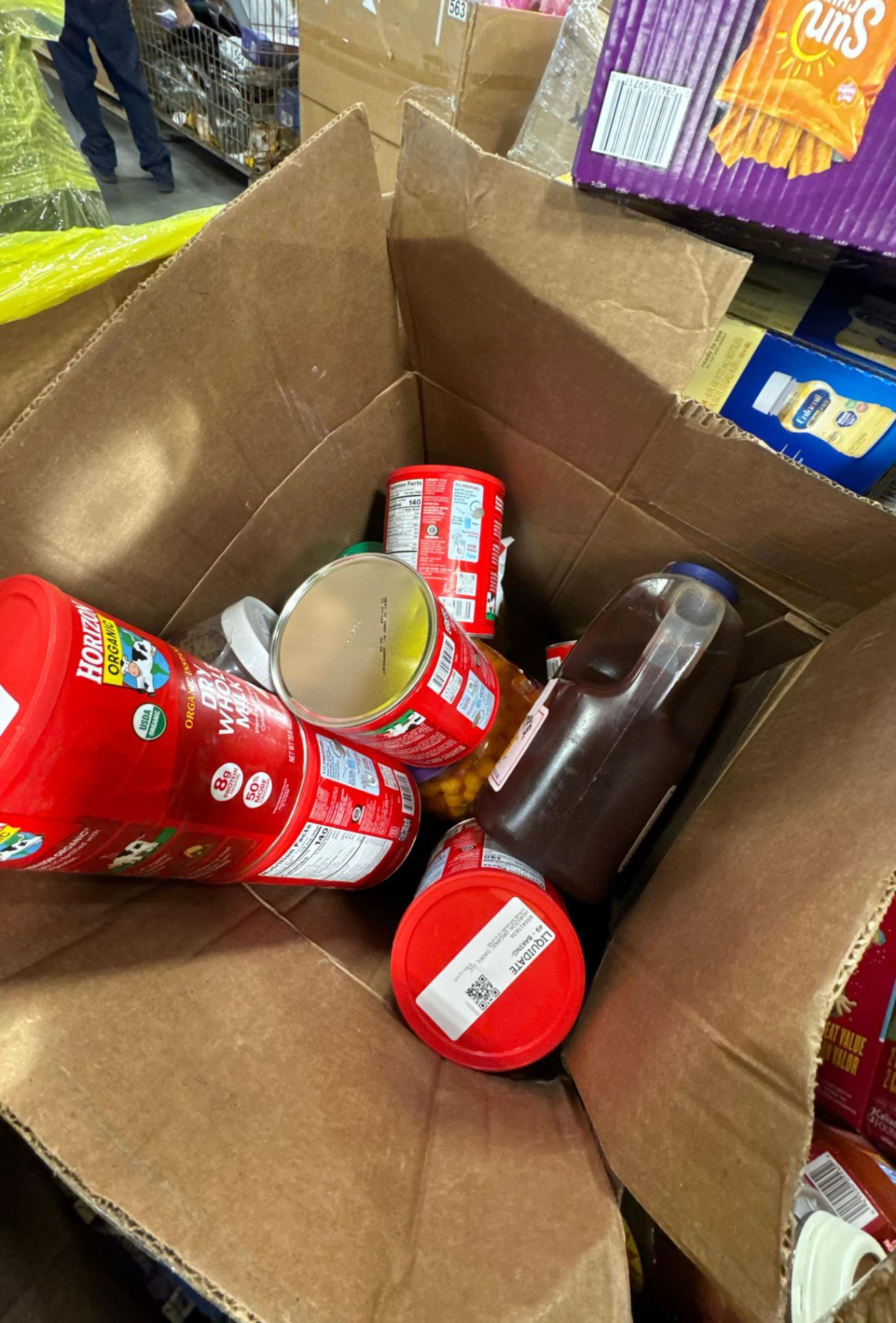 Big box store in a box: chips, corn, brownies, tuna, vegetable oil ...