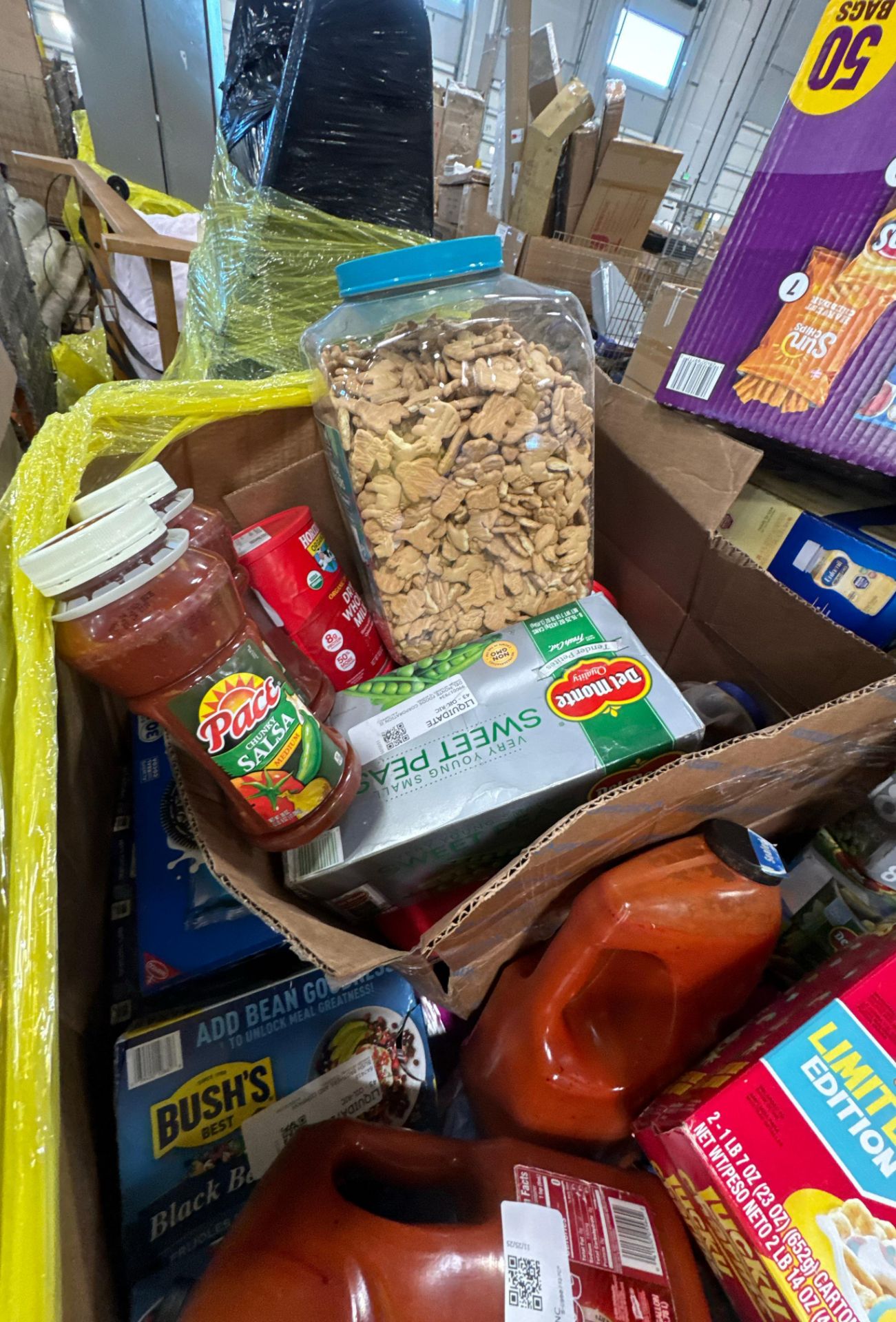 Big box store in a box: chips, corn, brownies, tuna, vegetable oil ...