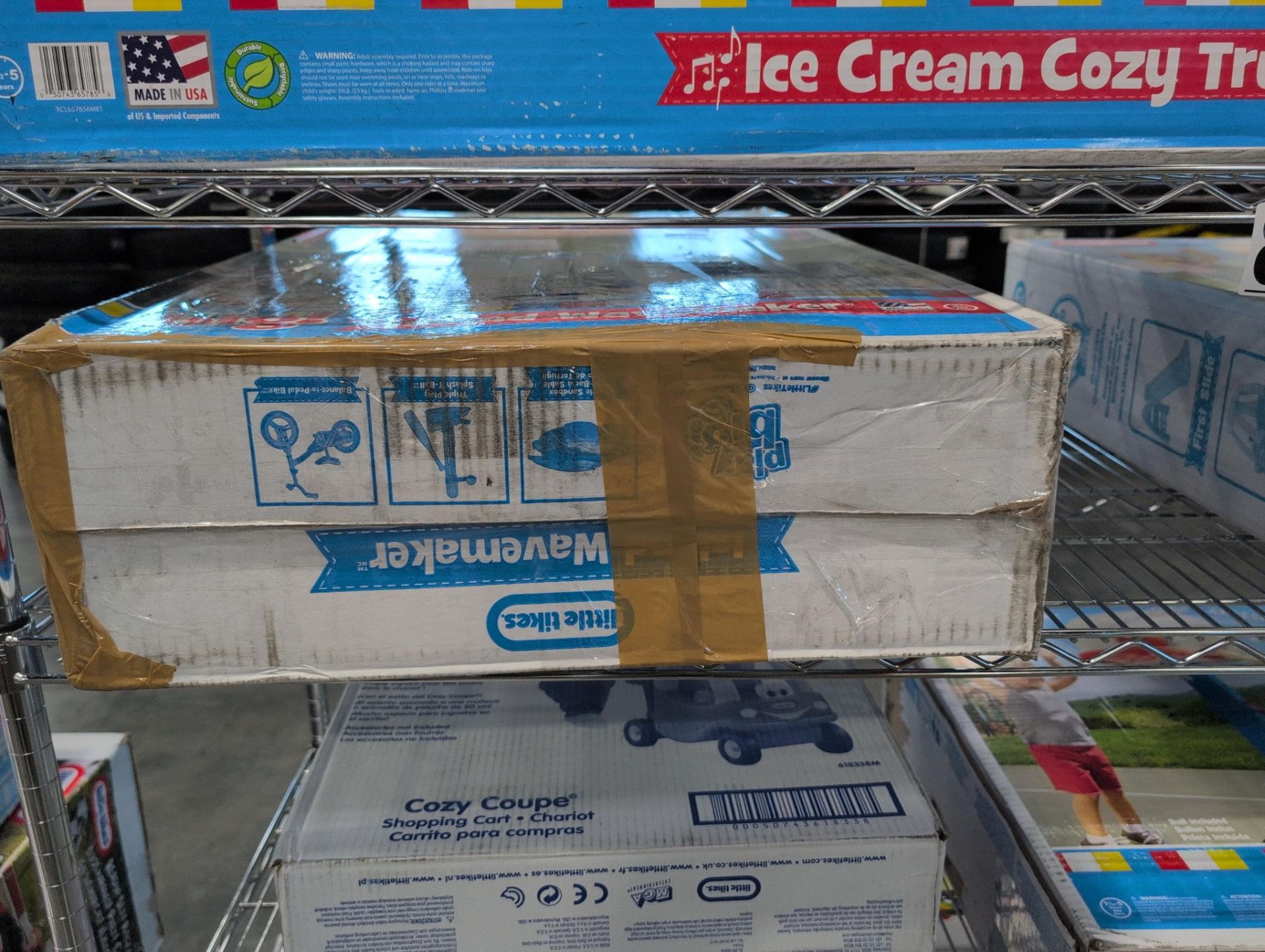 rolling rack of little tikes, ice cream sweet treat, shopping carts ...