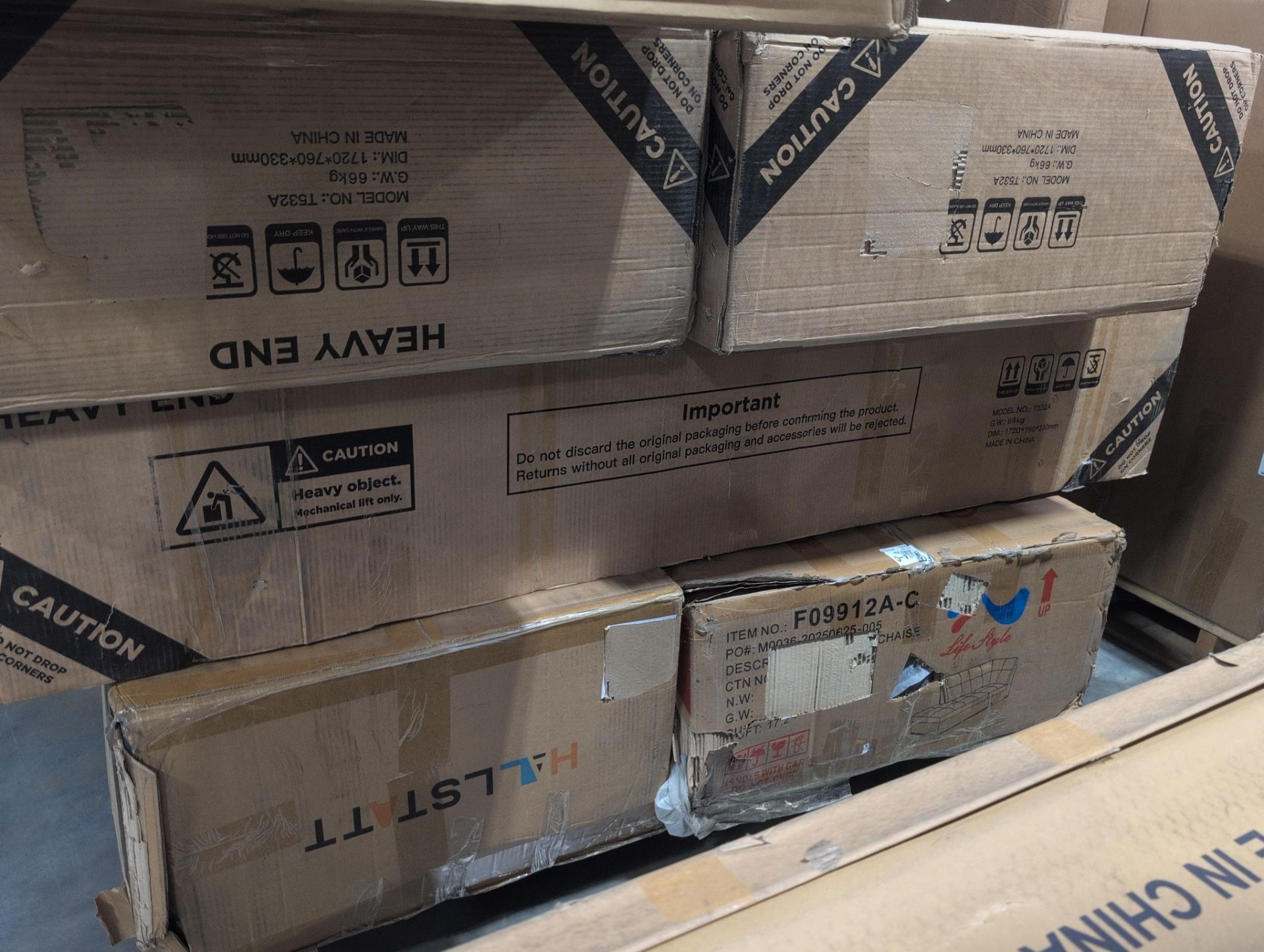 pallet of treadmills and furniture