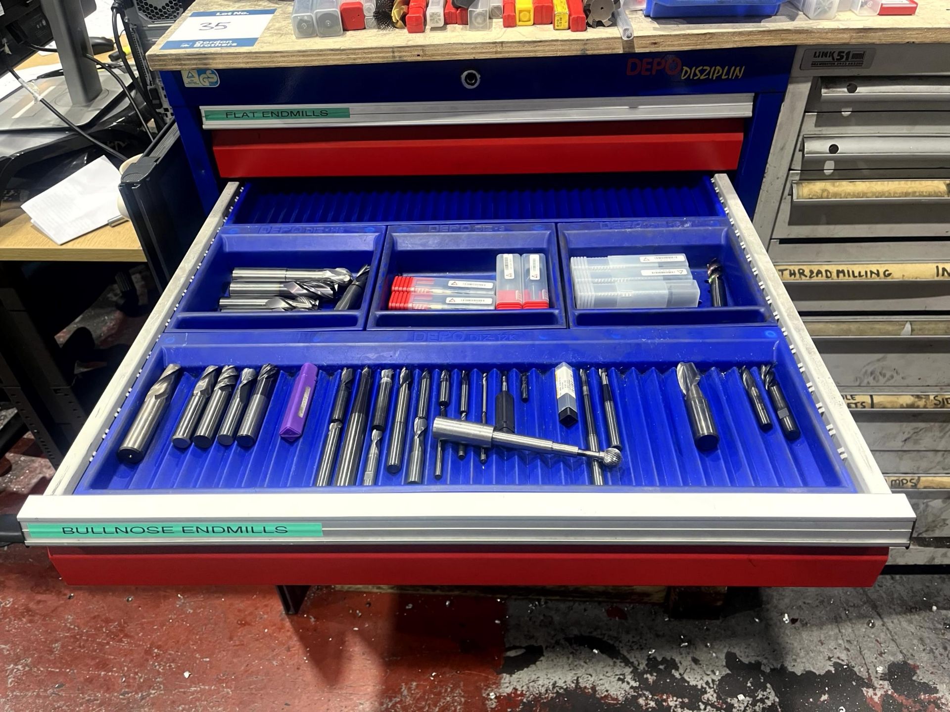 Two multi-drawer tool storage units with contents comprising facemill ...