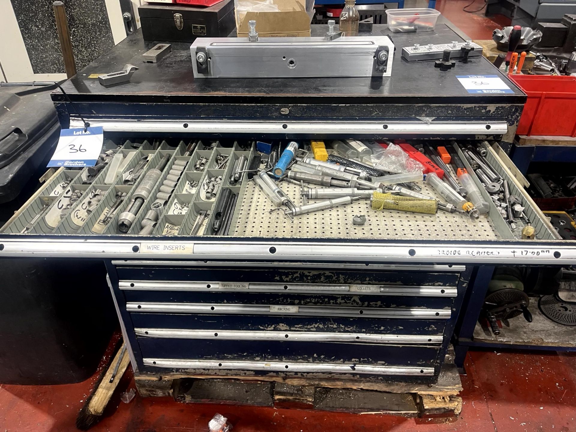 Multi-drawer tool storage unit with contents comprising wire inserts ...