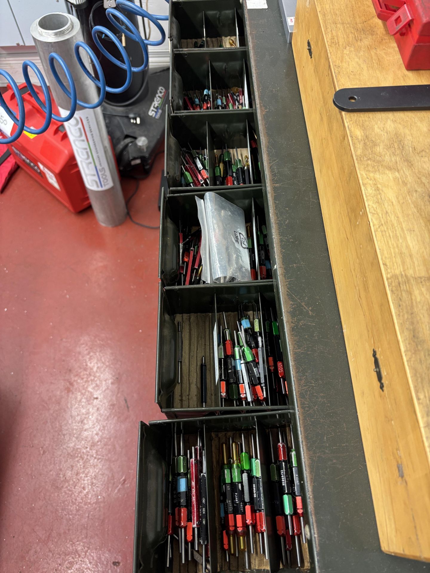 Metal 54-drawer storage unit with assorted measuring gauge contents ...