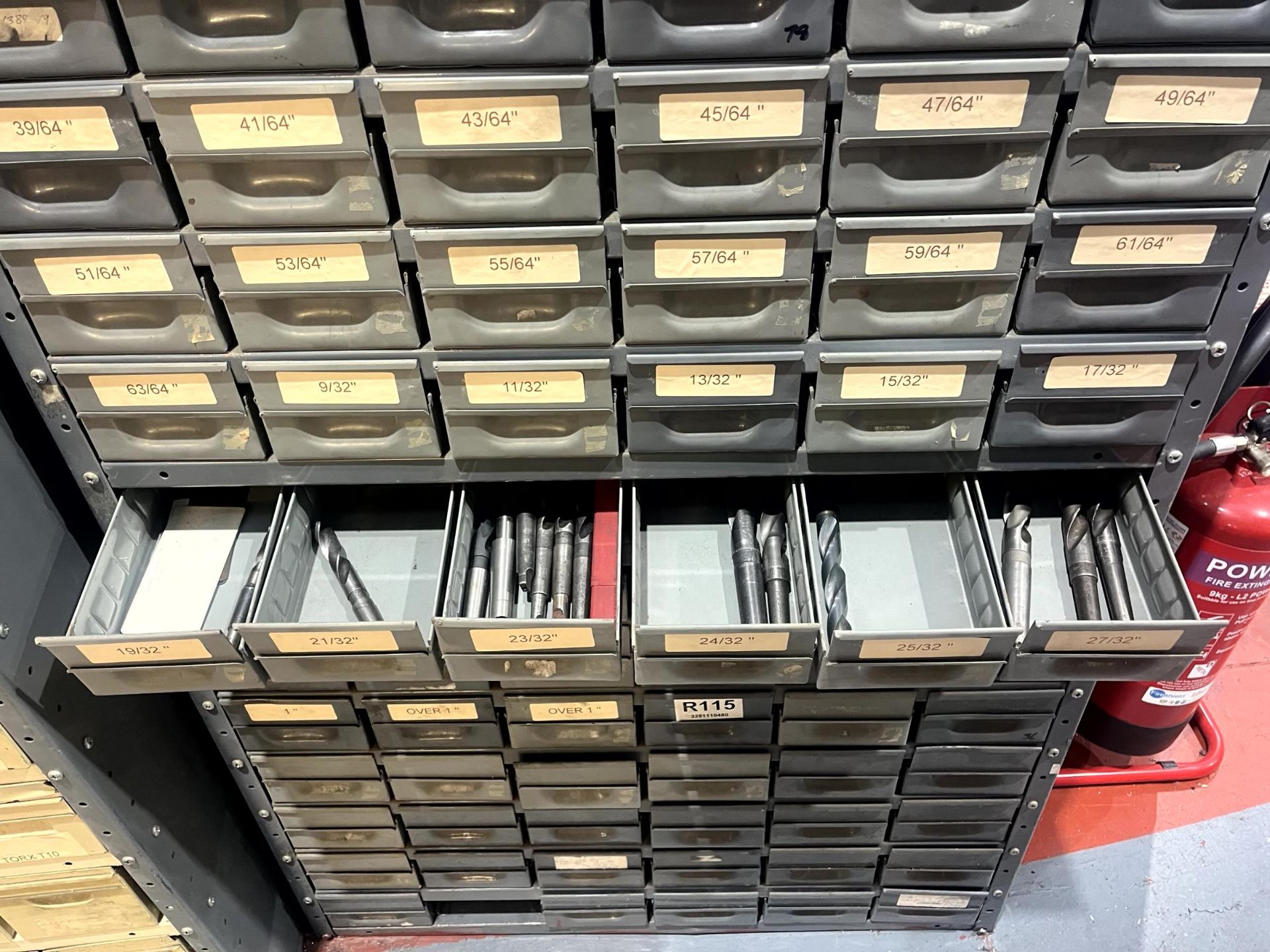 Two multi-drawer storage units with consumable contents and various ...