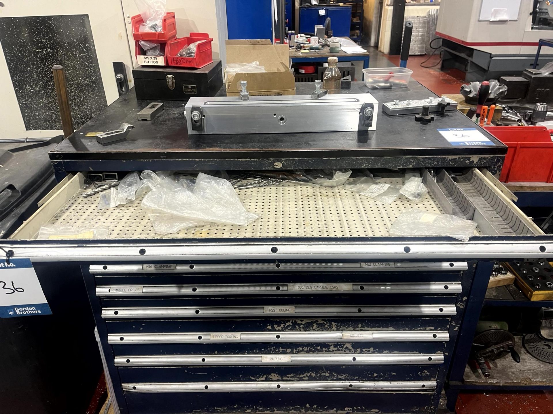 Multi-drawer tool storage unit with contents comprising wire inserts ...