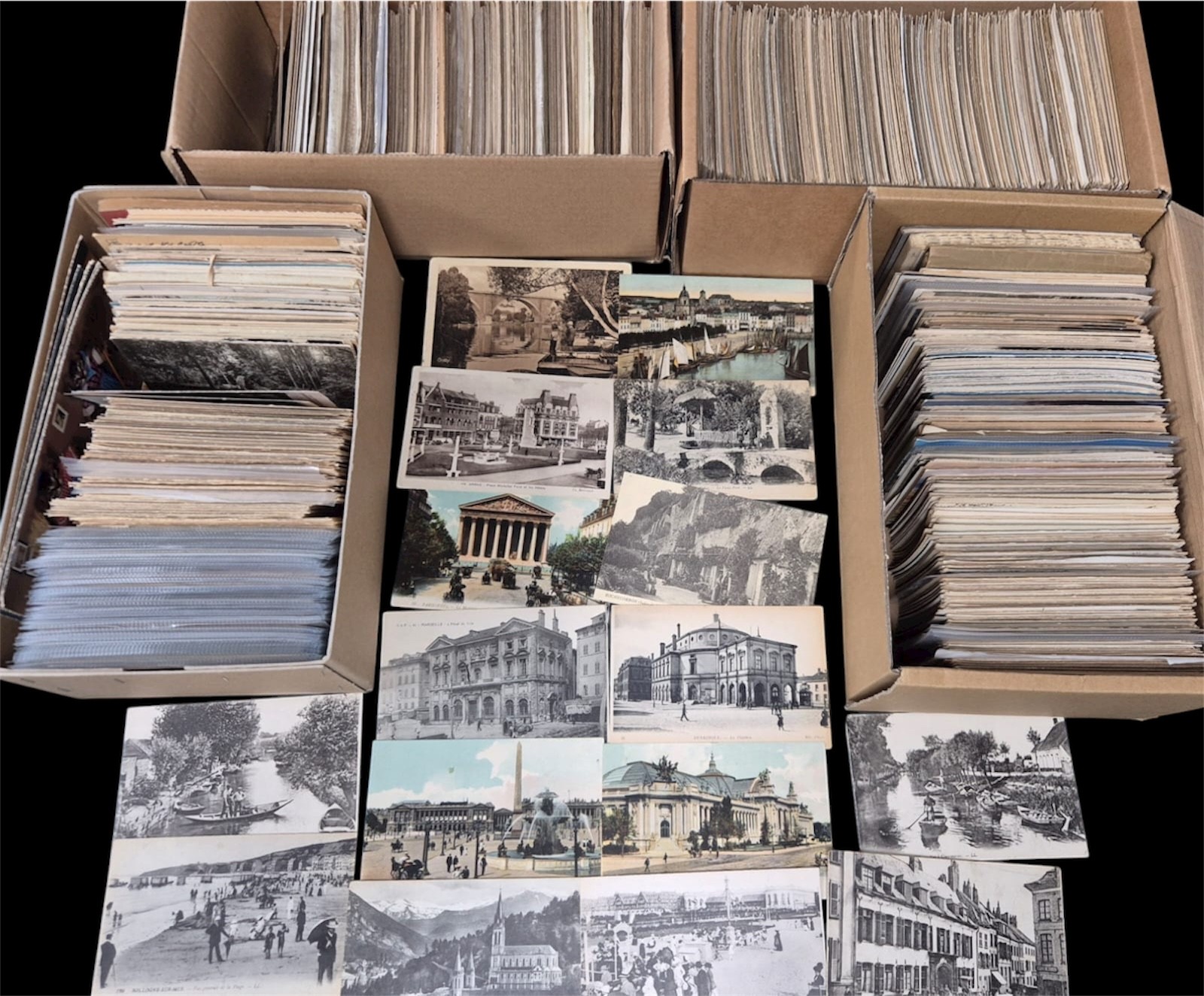 Postcard collection in four boxes, mainly overseas cards with ranges ...