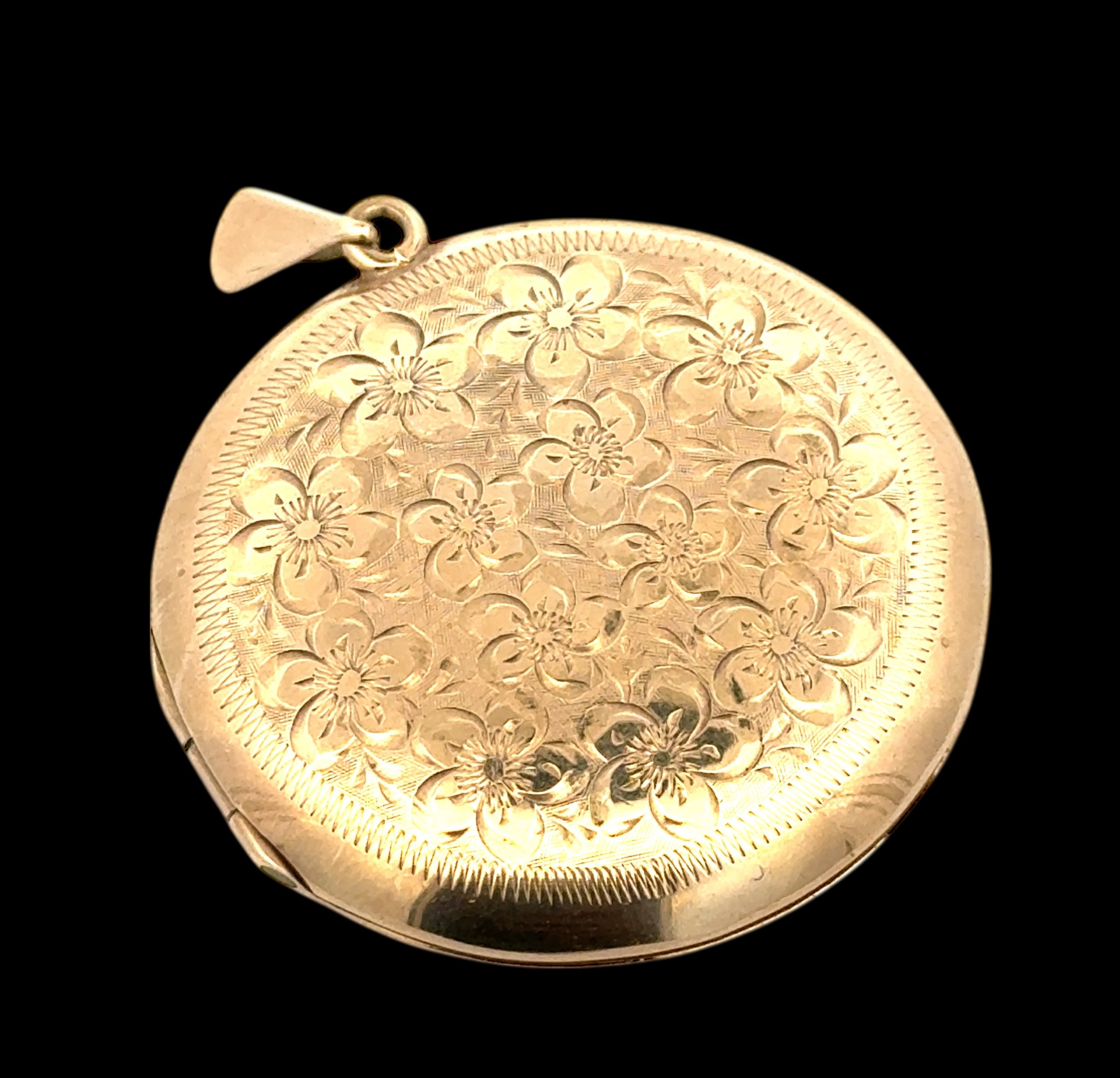 9ct gold circular locket with double photo compartments, the front ...