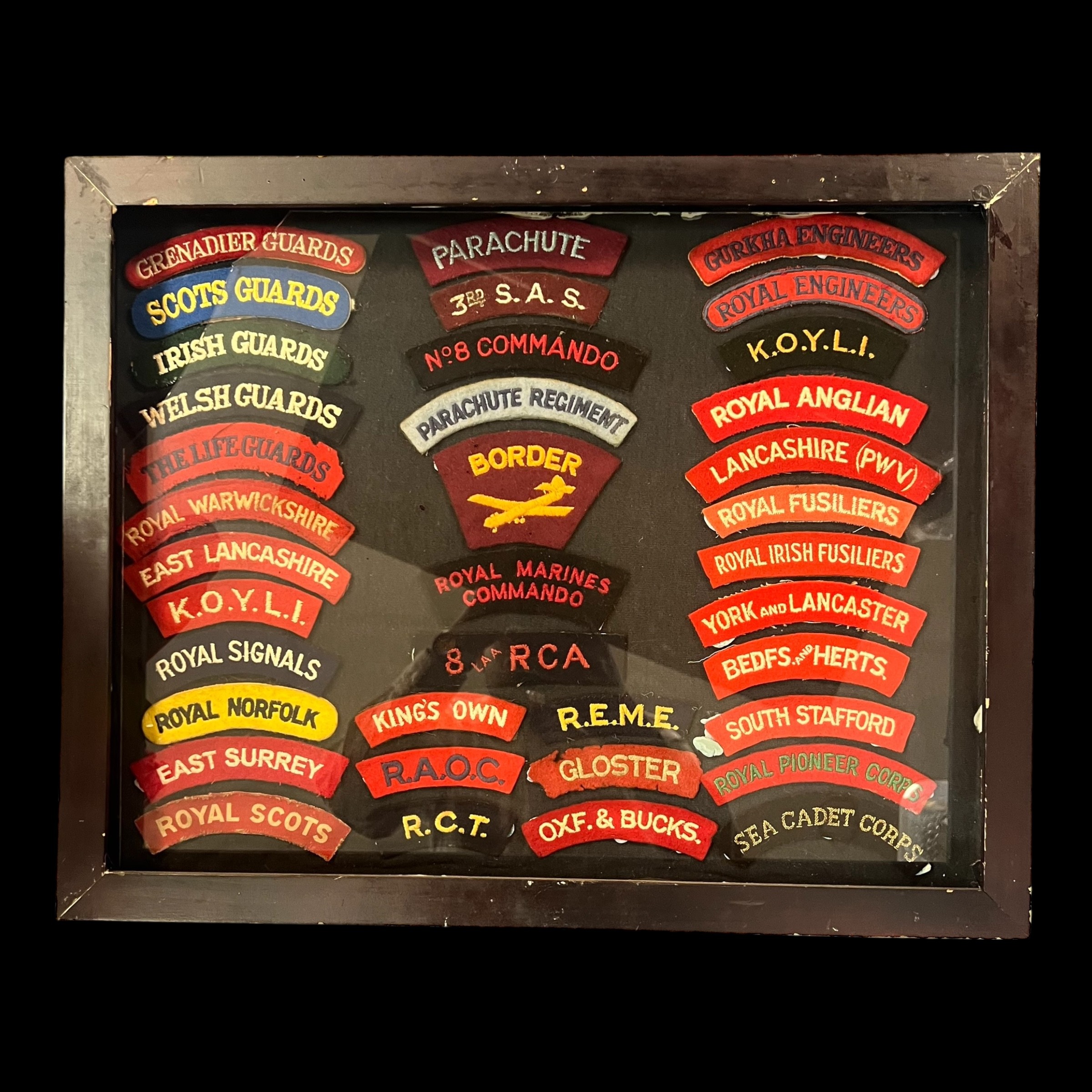Military Shoulder Title patches, collection in frame display (glass ...
