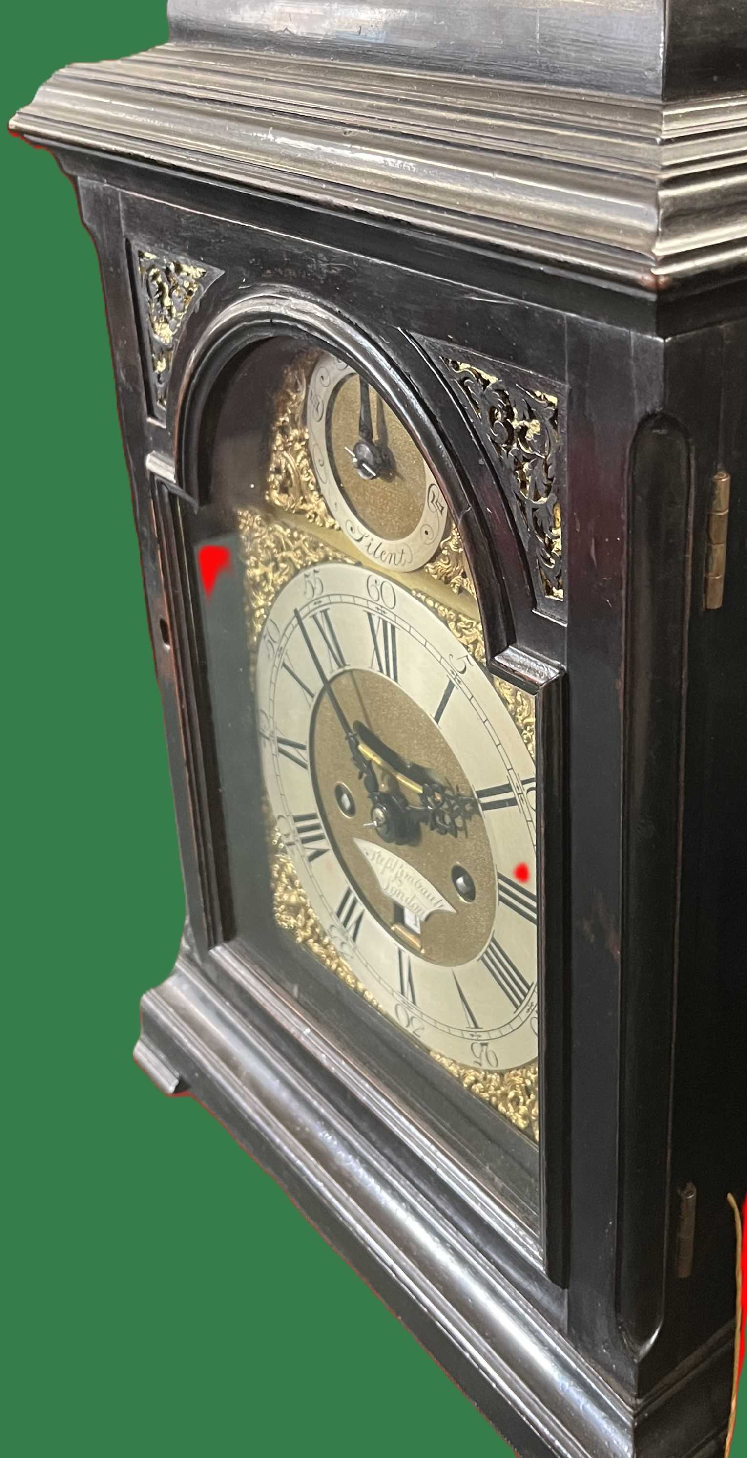 A George III brass mounted ebonized bracket clock with repeat strike by ...