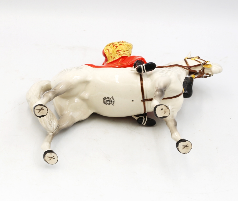 A Beswick horse and Rider model of Life guard on a Grey horse, model ...