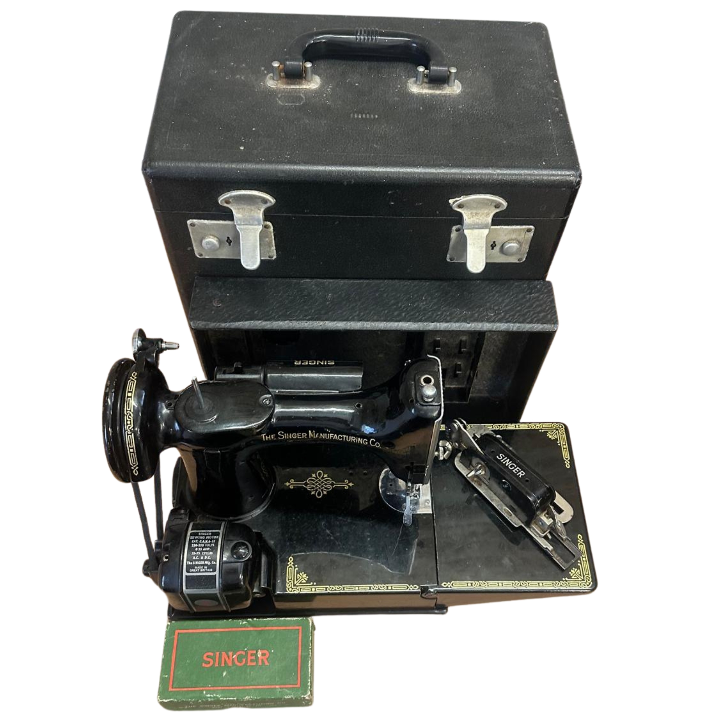 A Singer 221 electric portable sewing machine, with case, the fitted ...