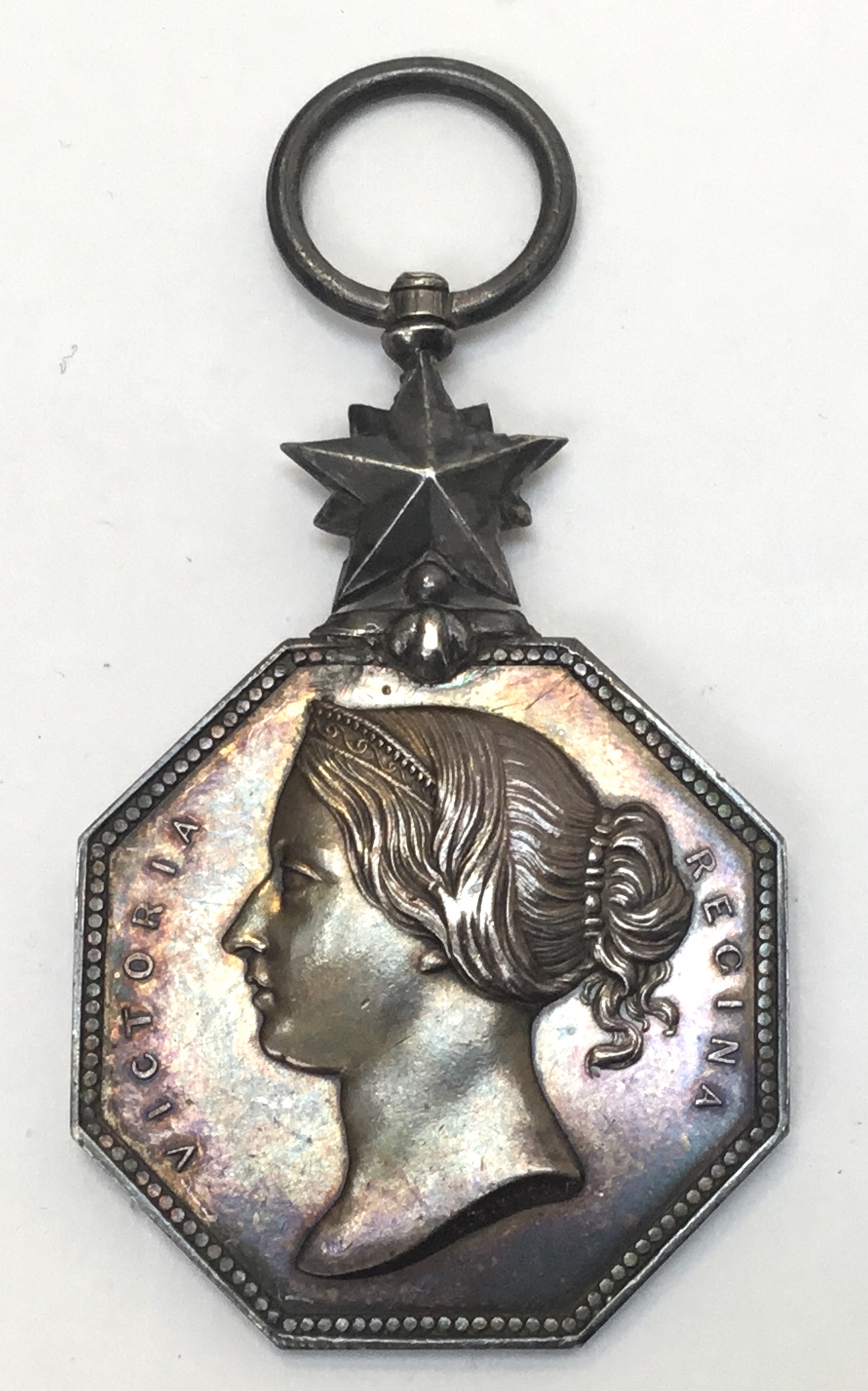 A rare 19th century Arctic Medal 1857.Octagonal in form, with 9 pointed ...
