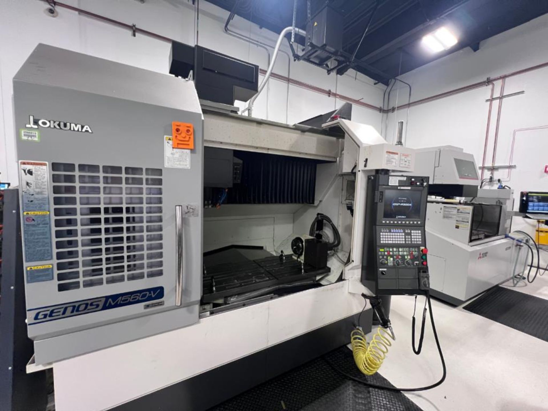 Okuma Genos M560-V CNC Machine includes Control Unit, MP 1200 Systems ...