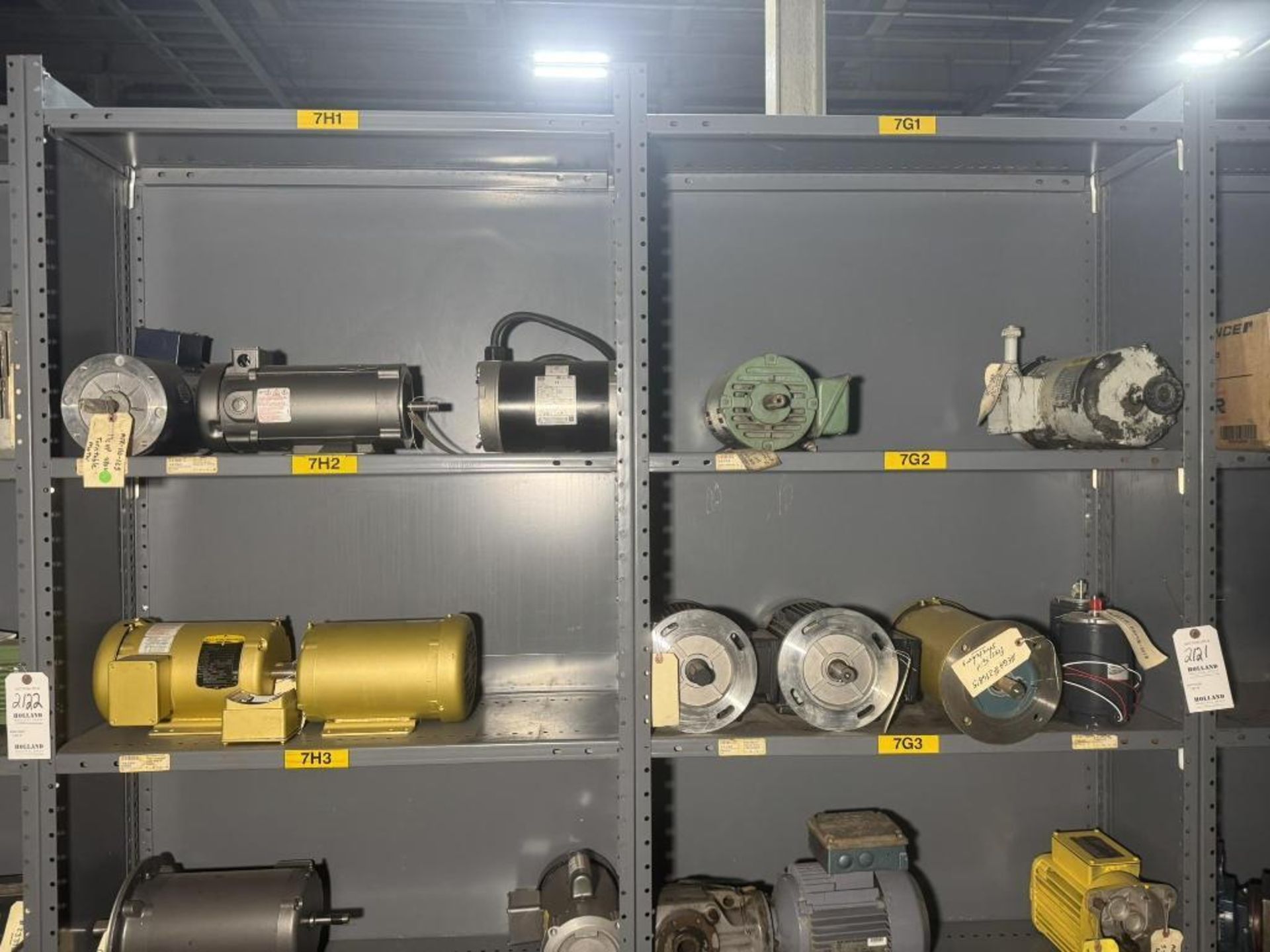 (2) SECTION OF MOTORS ON SHELVES