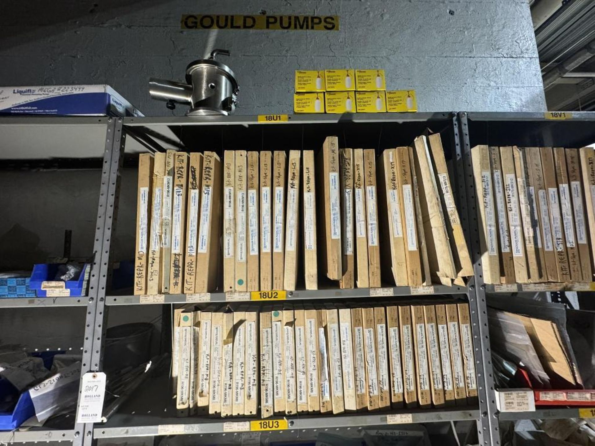 (2) SECTIONS OF PUMP PARTS ON SHELVES