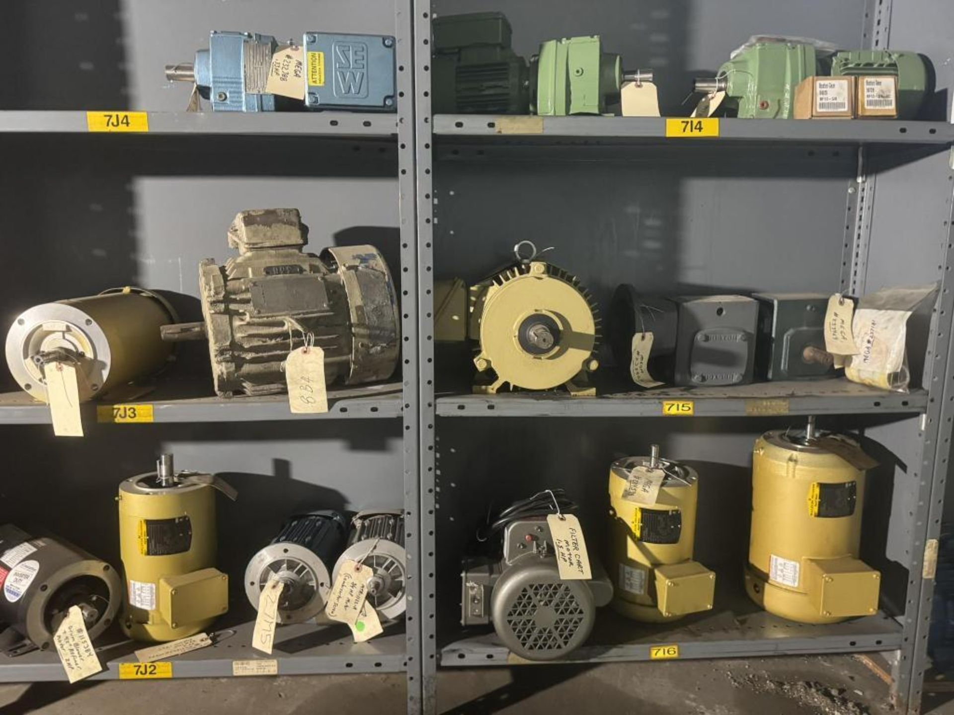 (3) SECTION OF MOTORS ON SHELVES