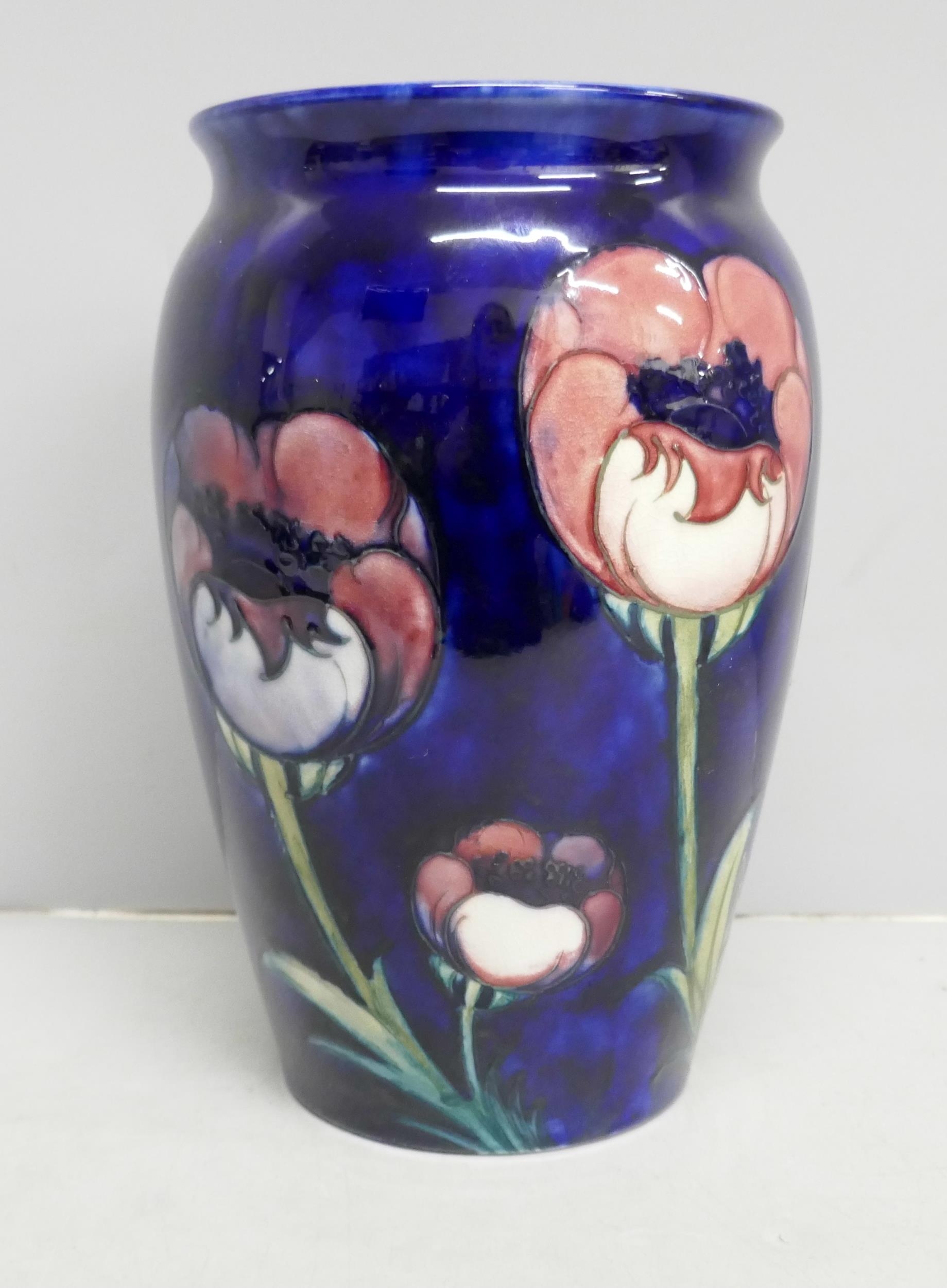 An early 20th century Moorcroft Poppy vase, 20.5cm