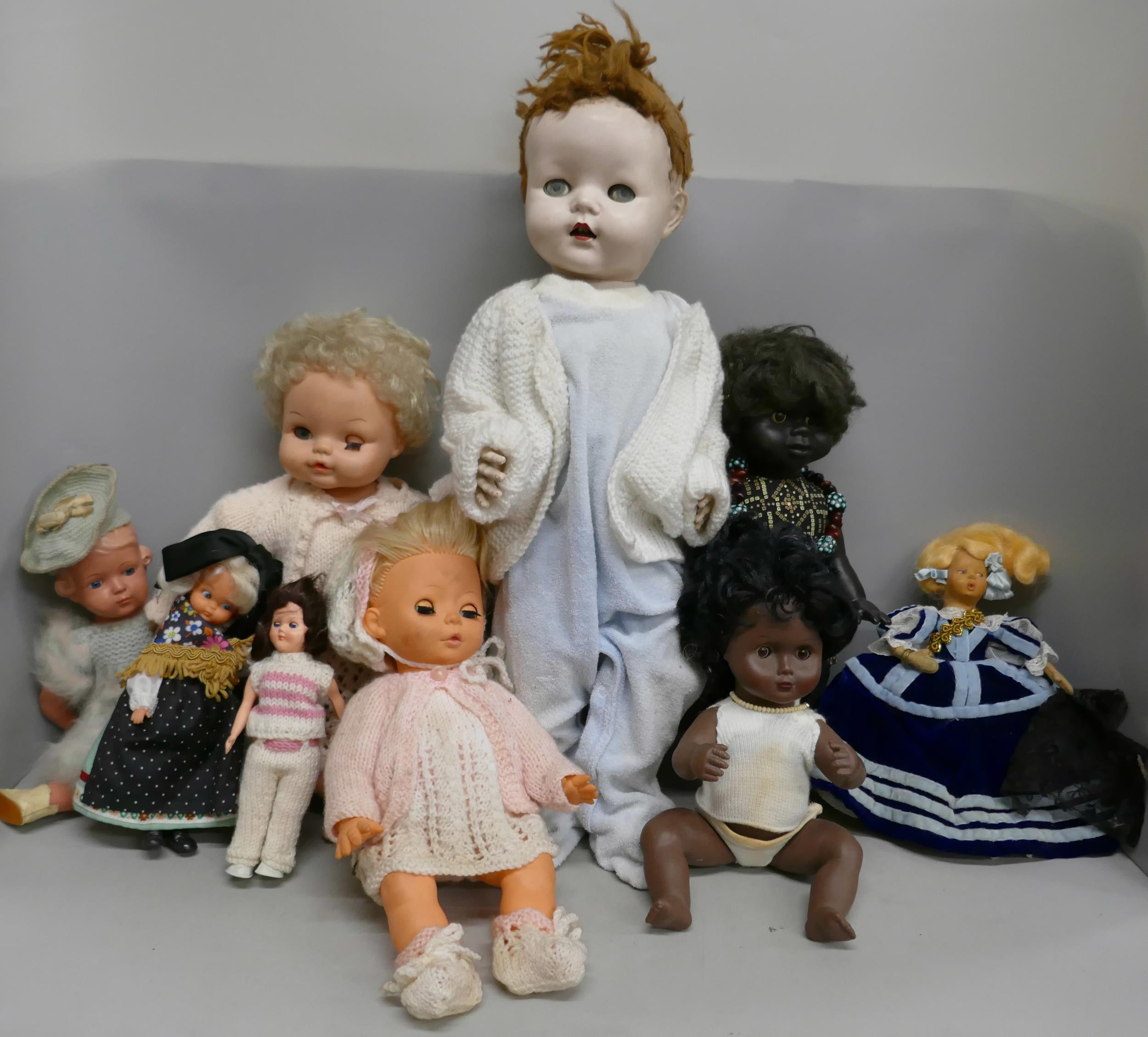 A box of vintage dolls