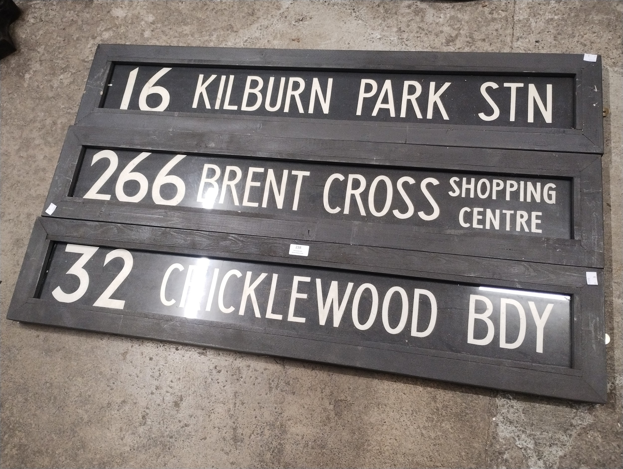 Three bus destination signs