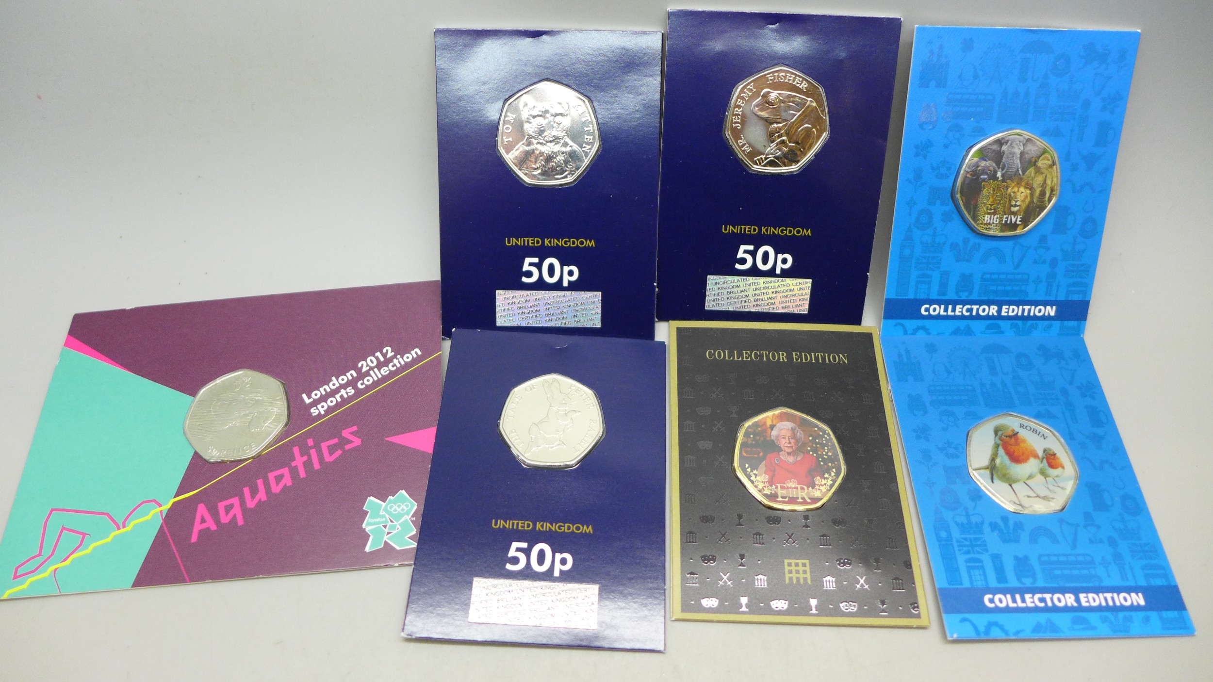 Seven 50p collectable coins