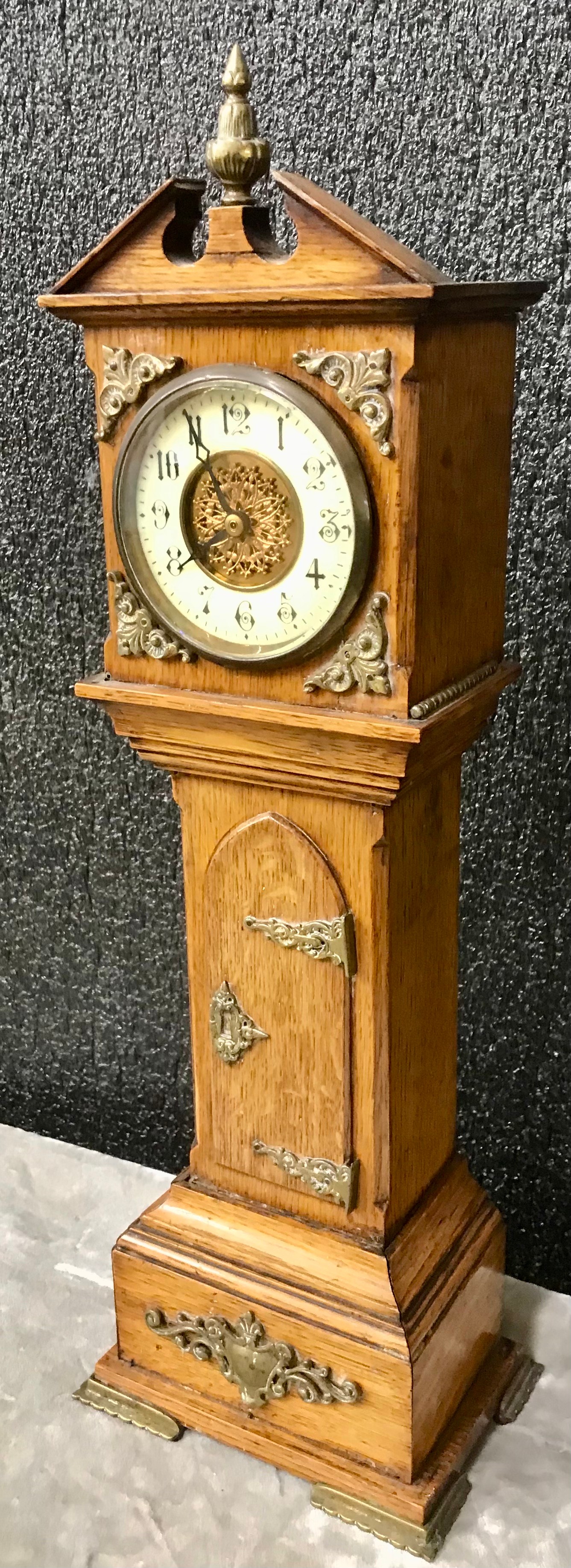 A George III style oak and brass mounted miniature longcase clock