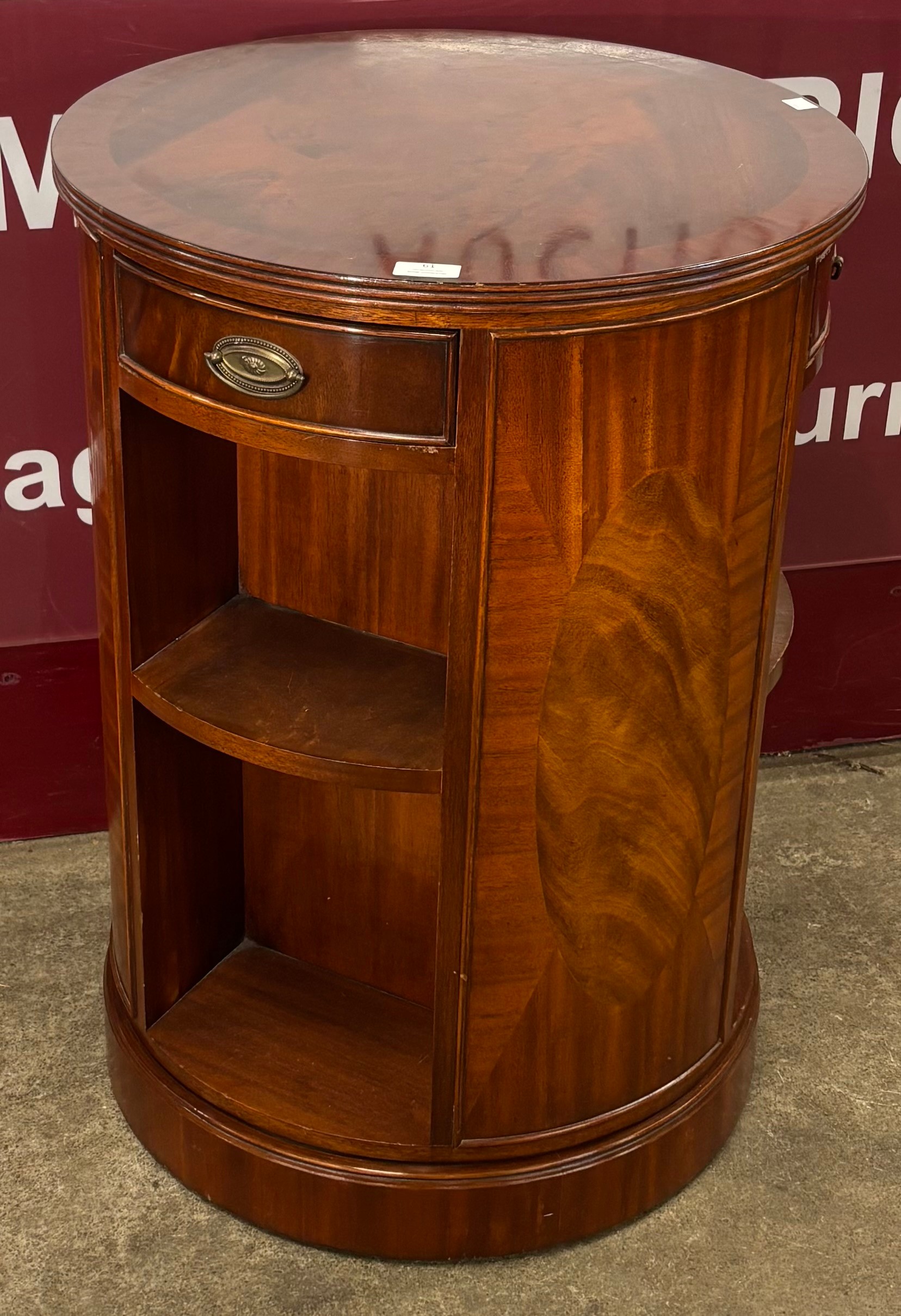 A Regency style mahogany cylindrical revolving bookcase