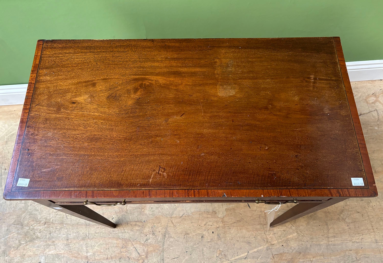 A mahogany and cross-banded side table with frieze drawer on line ...