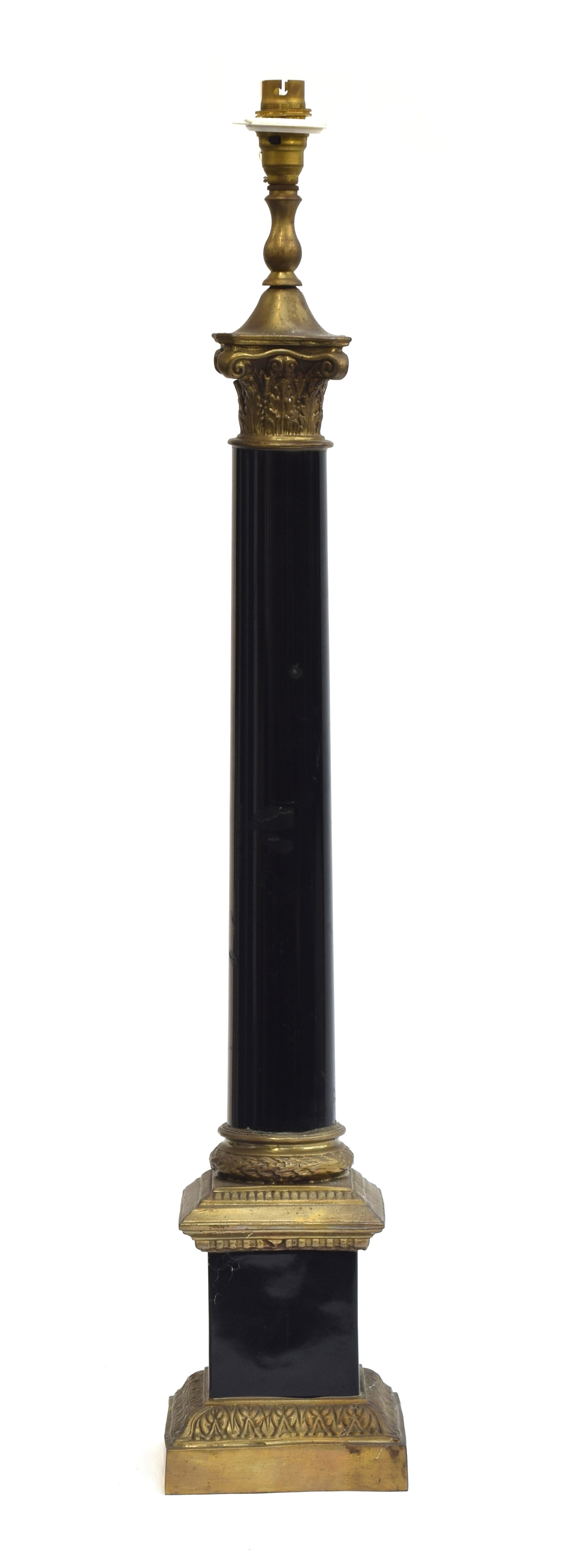 A large and heavy gilt metal table lamp in the form of an ebonised ...