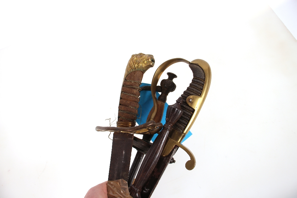 Four various swords (no scabbards)