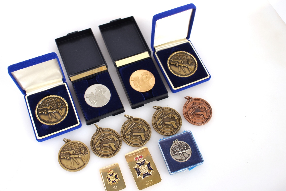A quantity of various shooting prize medallions