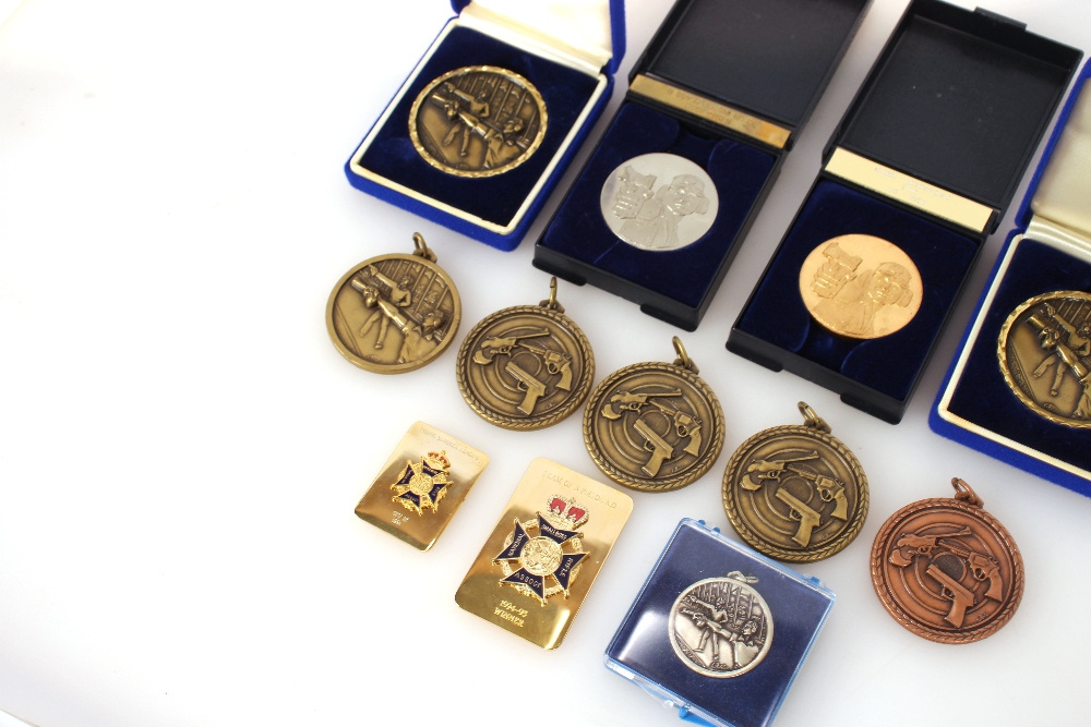 A quantity of various shooting prize medallions
