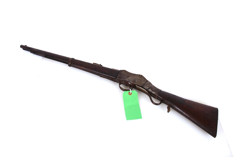 A >577/450 carbine, marked Martini Muscat with ethnic embellishment and AF