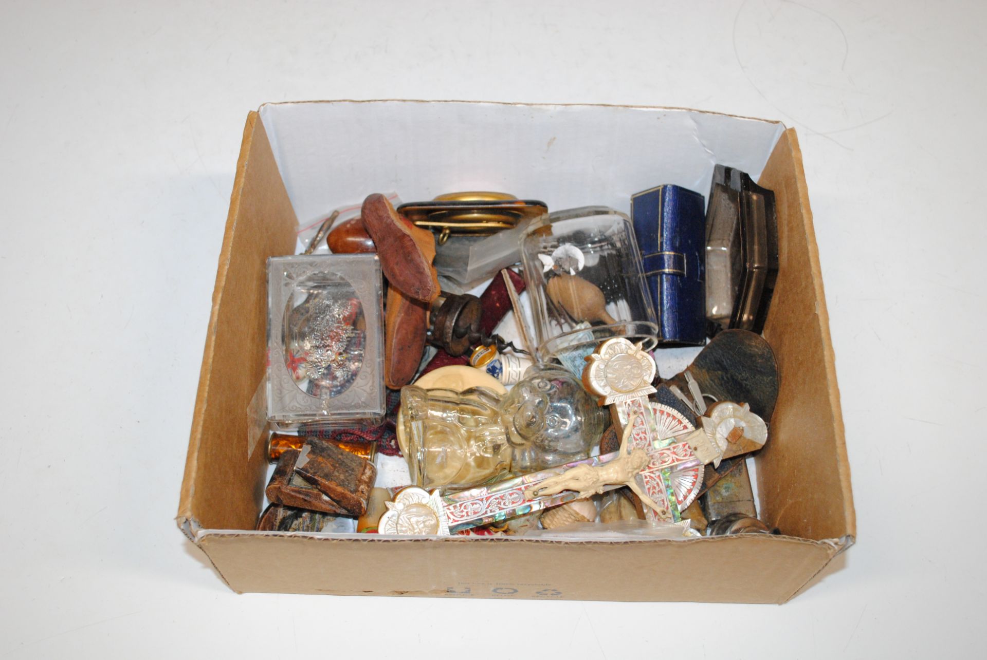 A box of interesting small sundry items to include mother of pearl ...