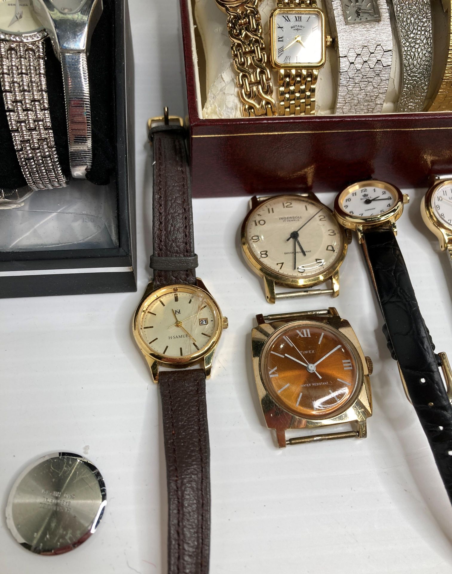 Fifteen assorted watches; including thirteen gold-tone Corvette, Rotary ...