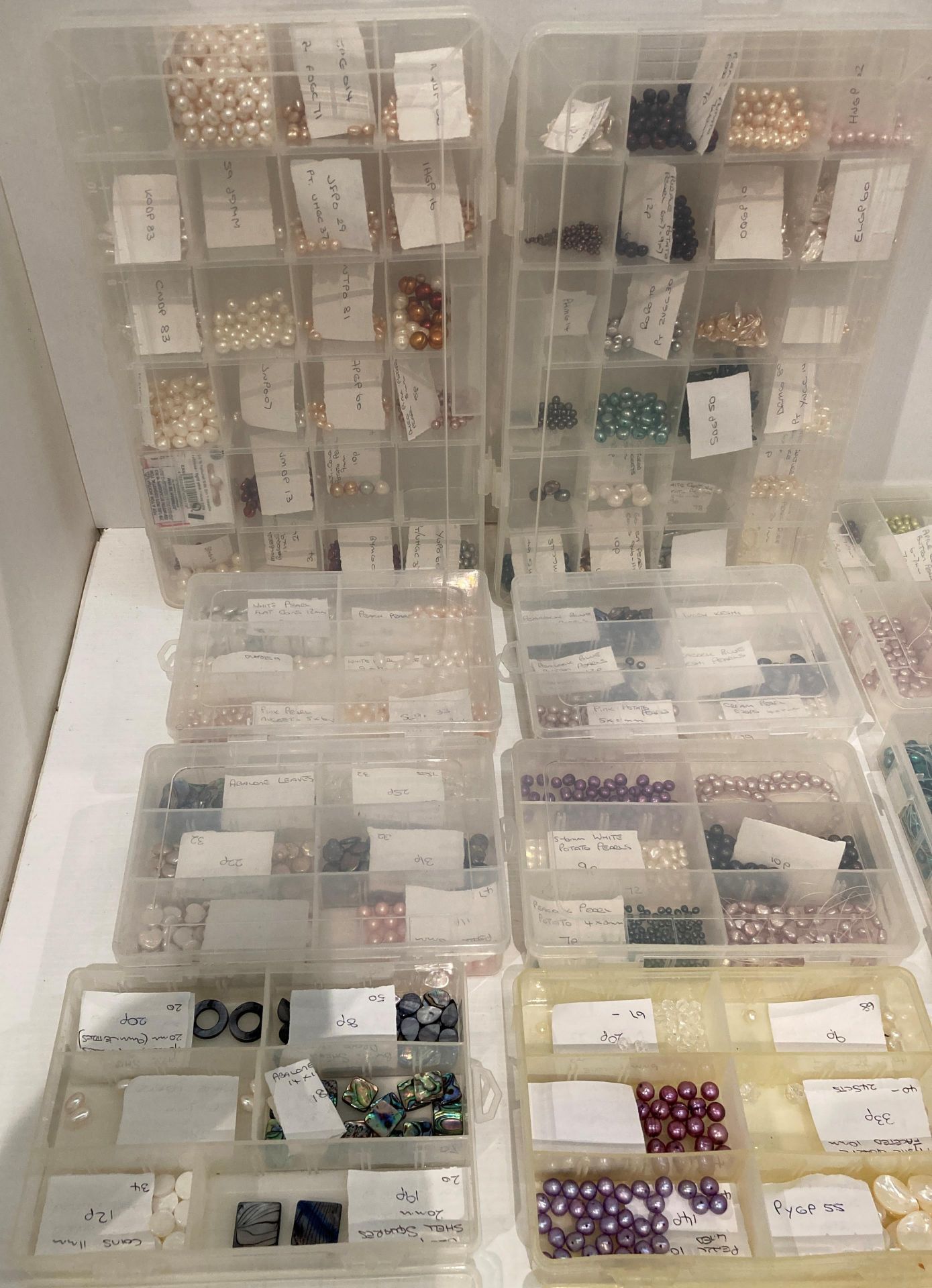 Eleven assorted multi-compartment cases with large quantity of assorted ...