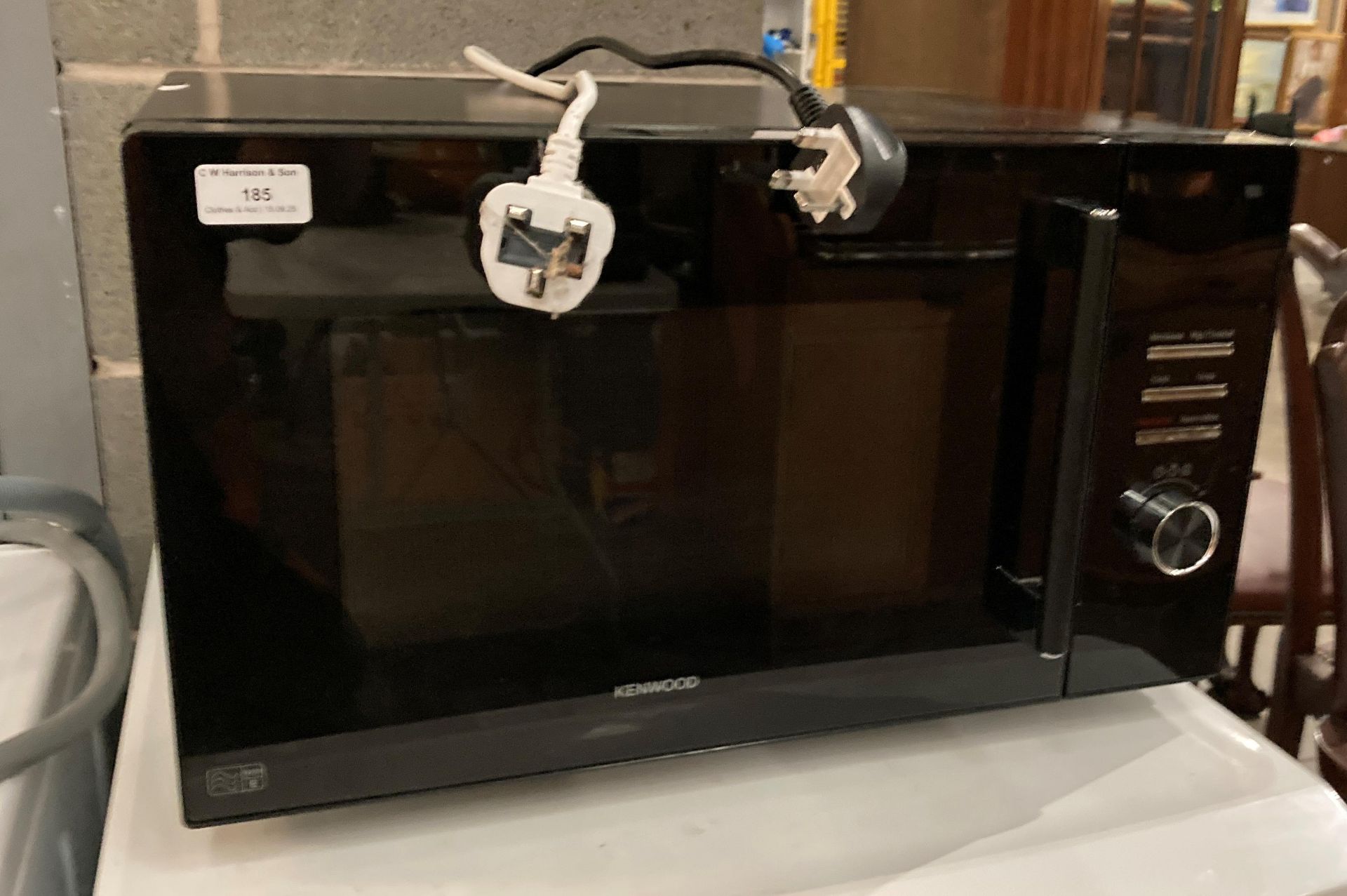 A Kenwood K25MB21 microwave (CWH Ref: PO)