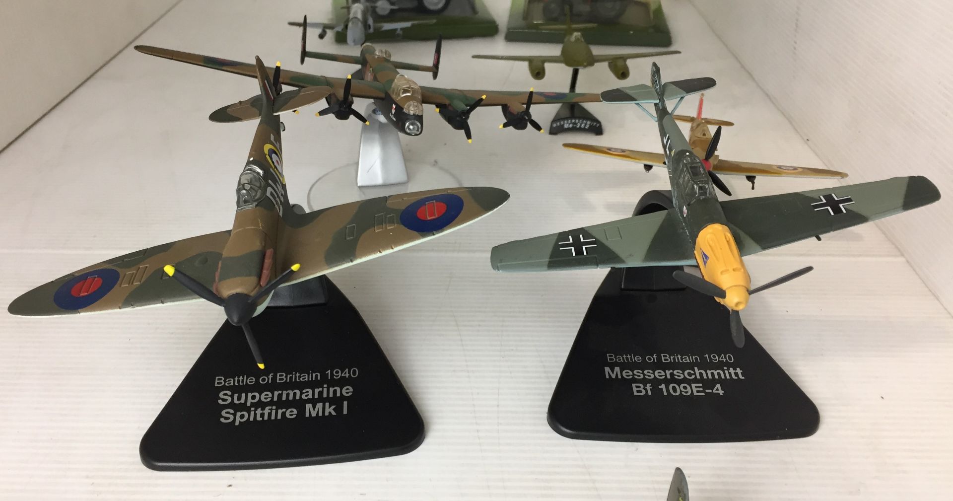 Ten diecast models including eight military aircraft and two tractors ...