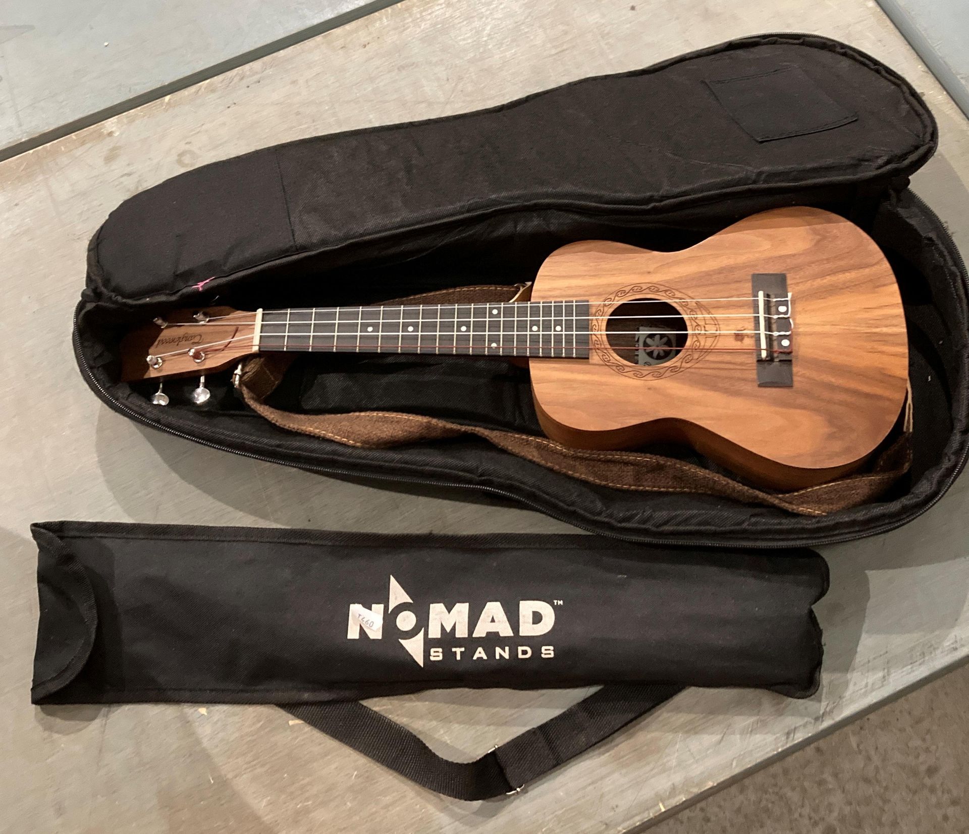 Tanglewood ukulele with Rocket Music soft carry bag and a Nomad music ...