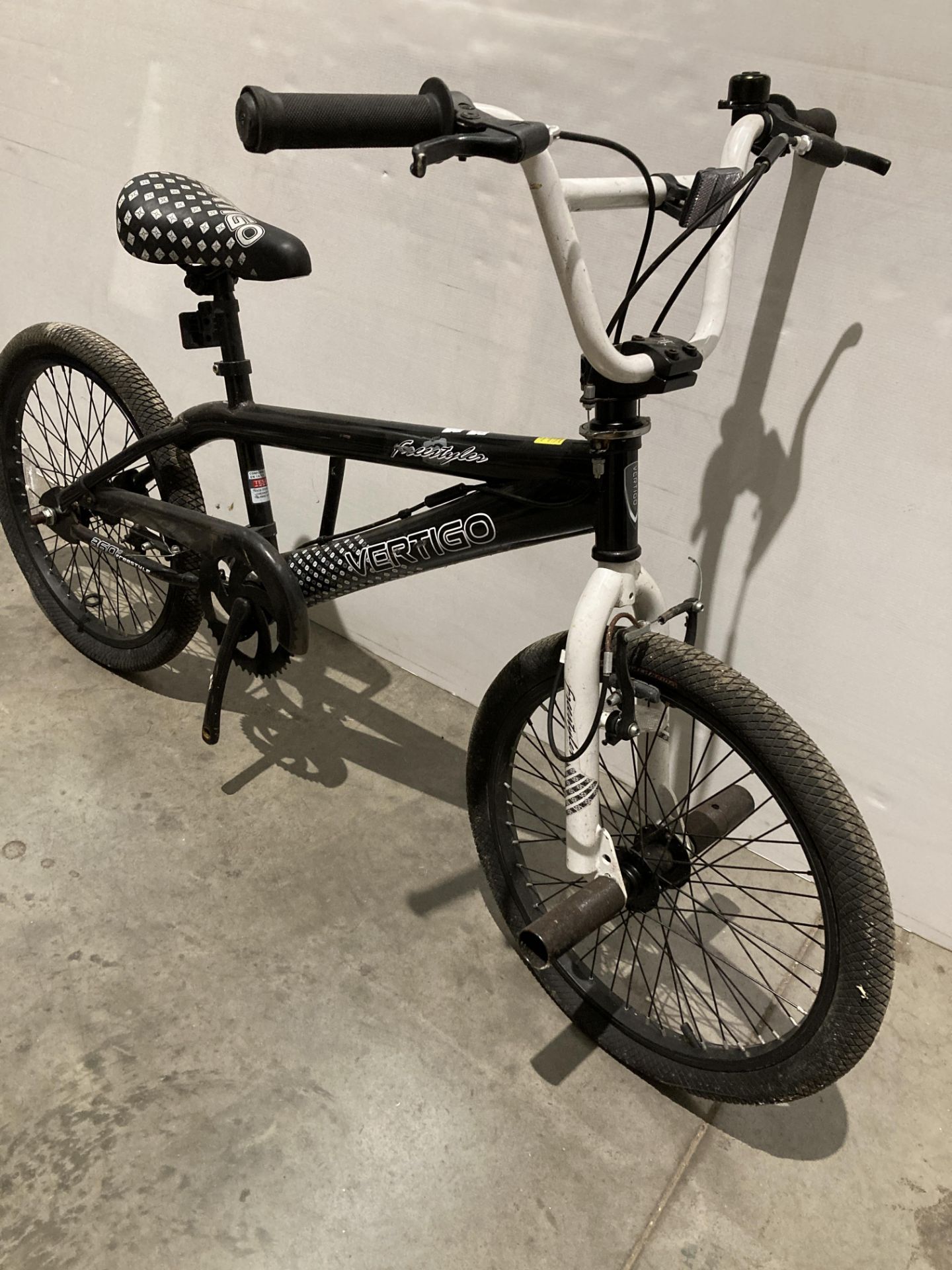 A Muddy Fox Grand Freestyle BMX with rear pegs (old gyro missing on ...