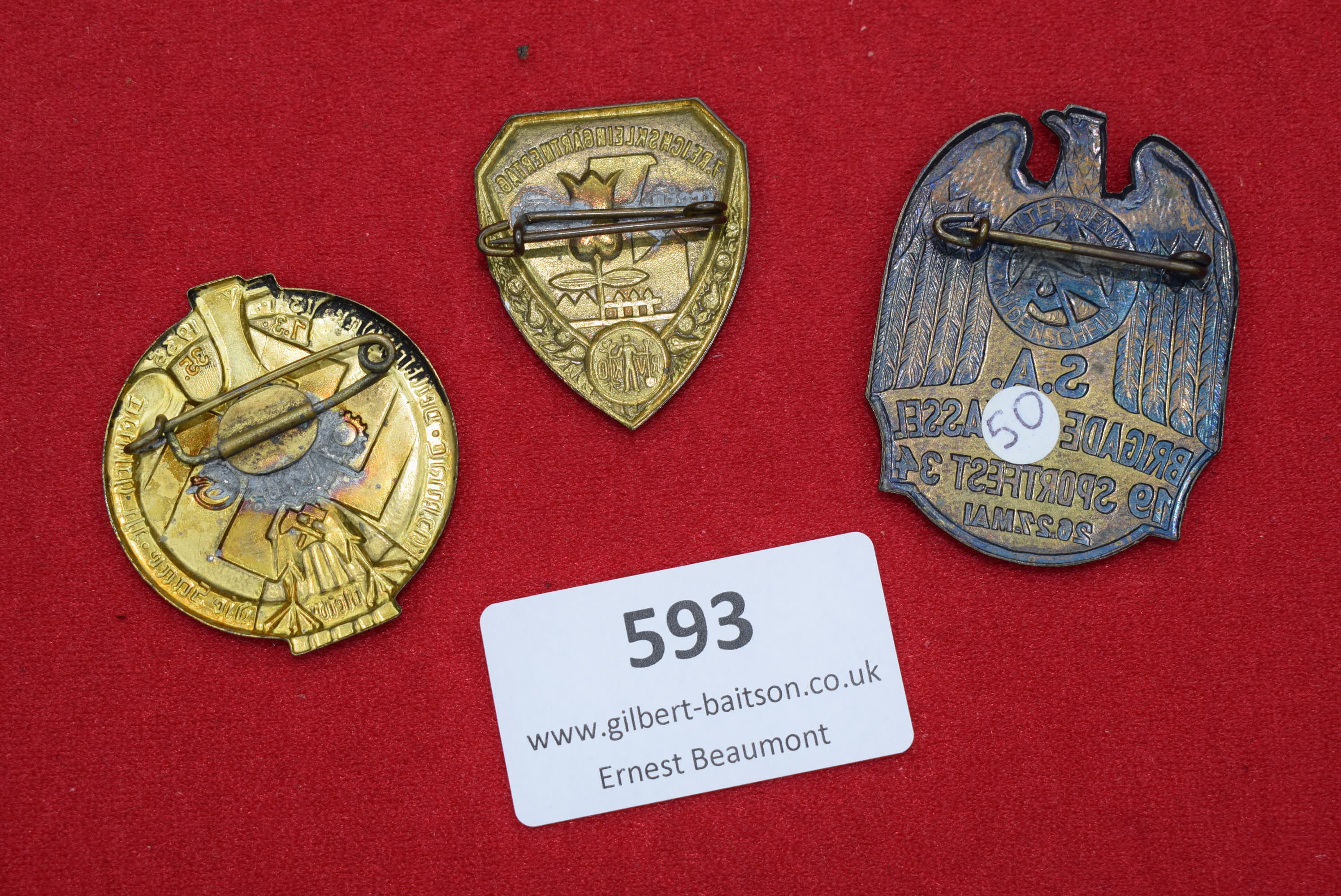 Three German Third Reich Day Badges including: circular 1935 badge with ...